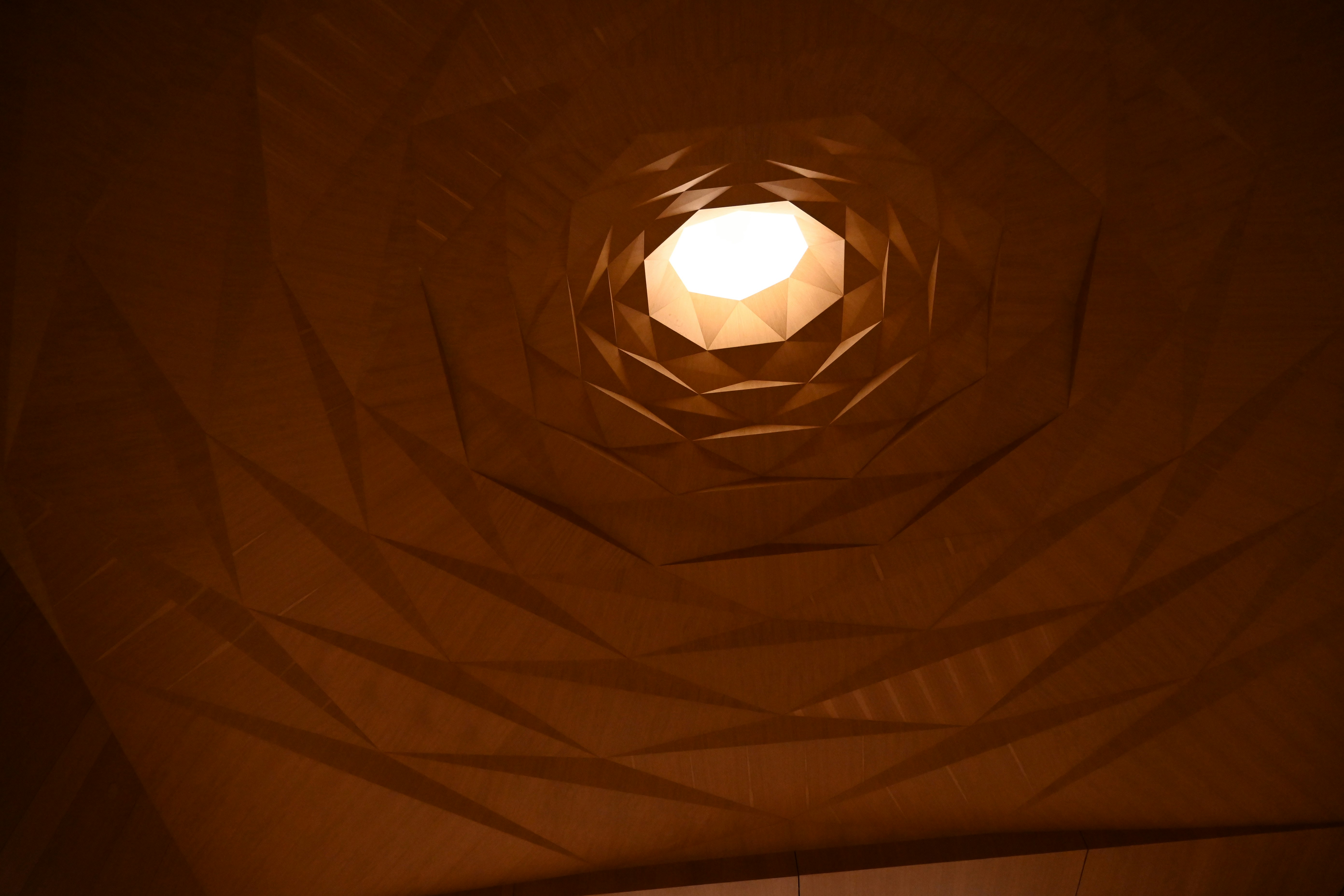 Geometric ceiling with a central light source