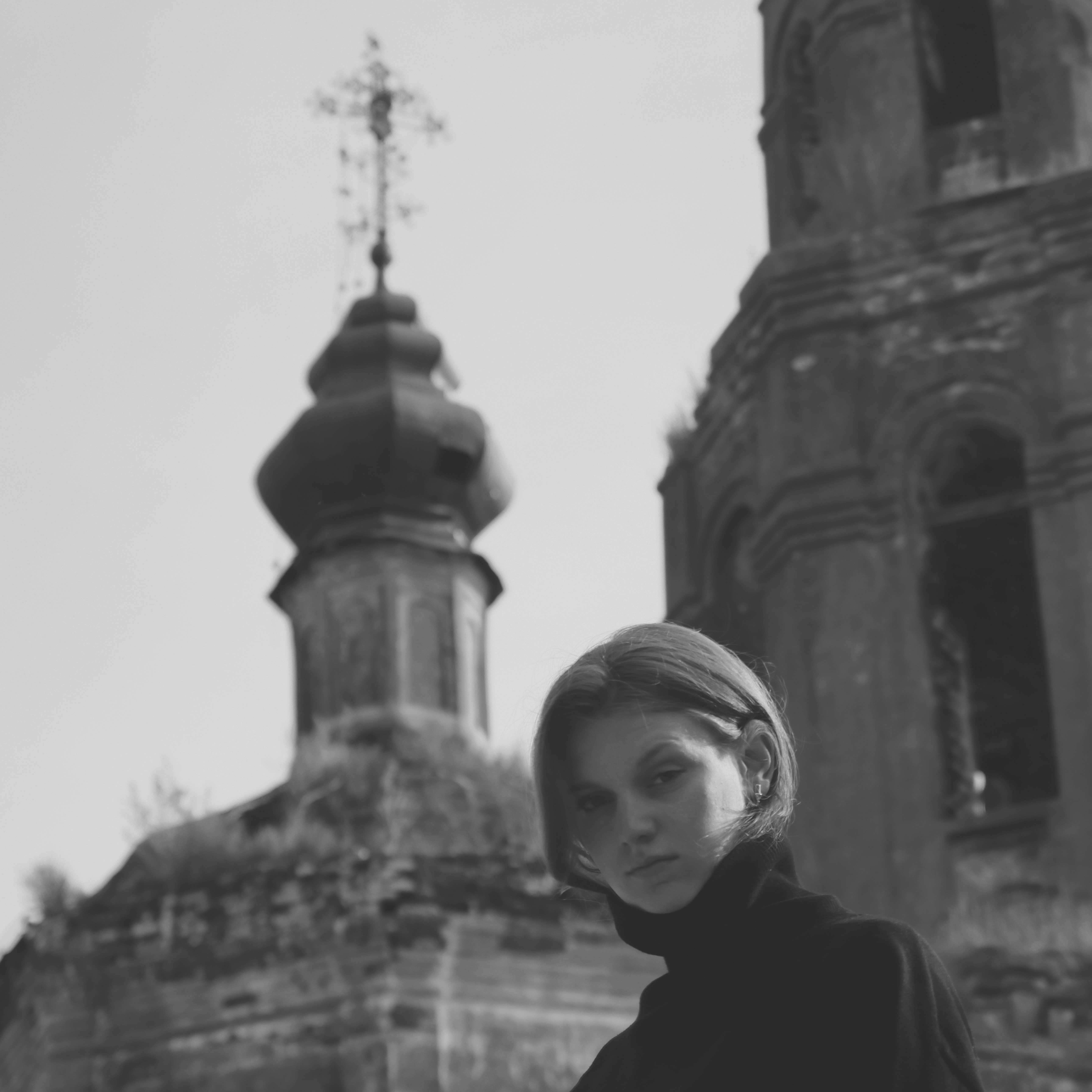 Whisper in Stone: Portrait Against a Ruined Cathedral