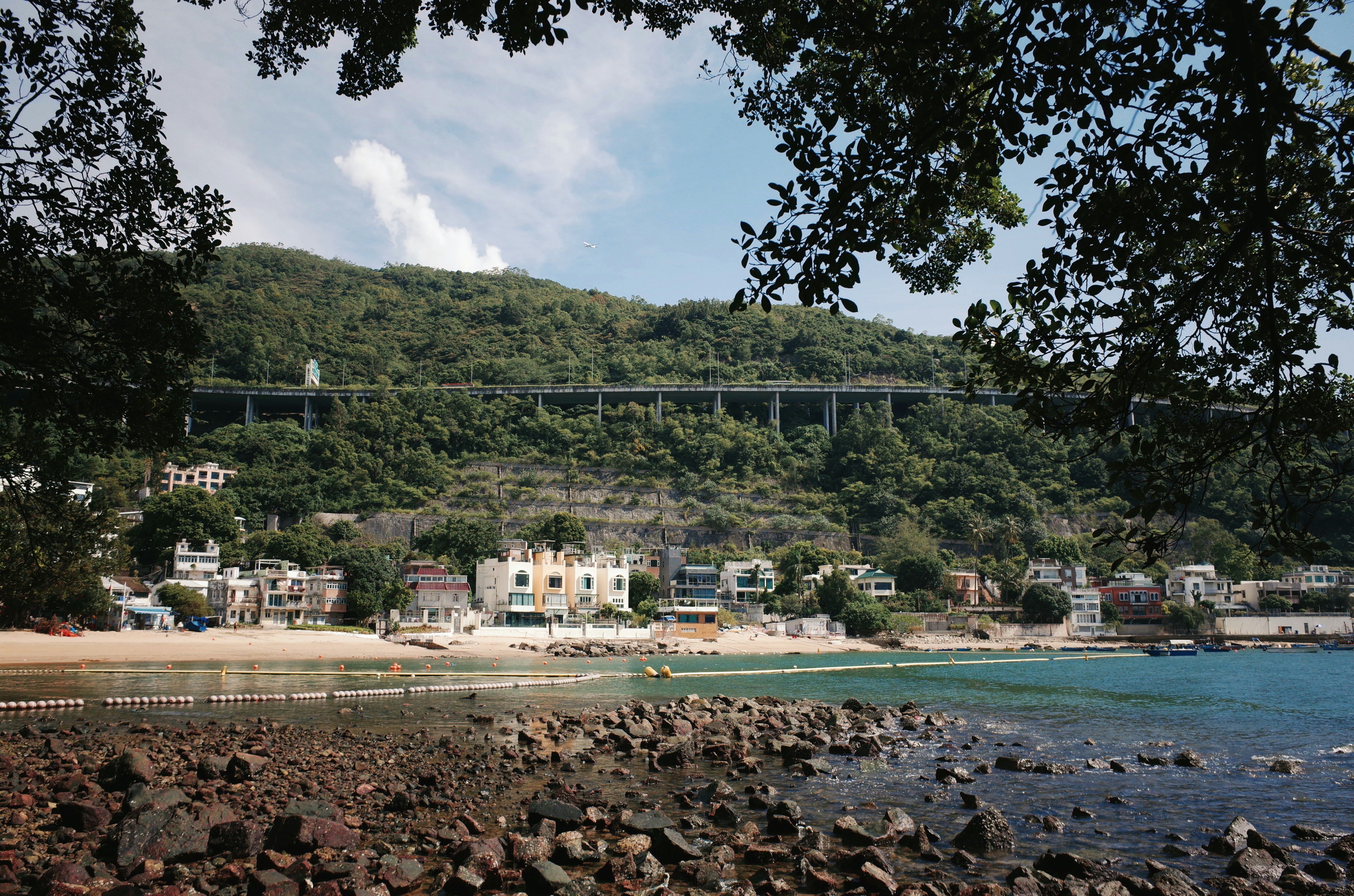 Coastal Serenity Under Urban Shadows