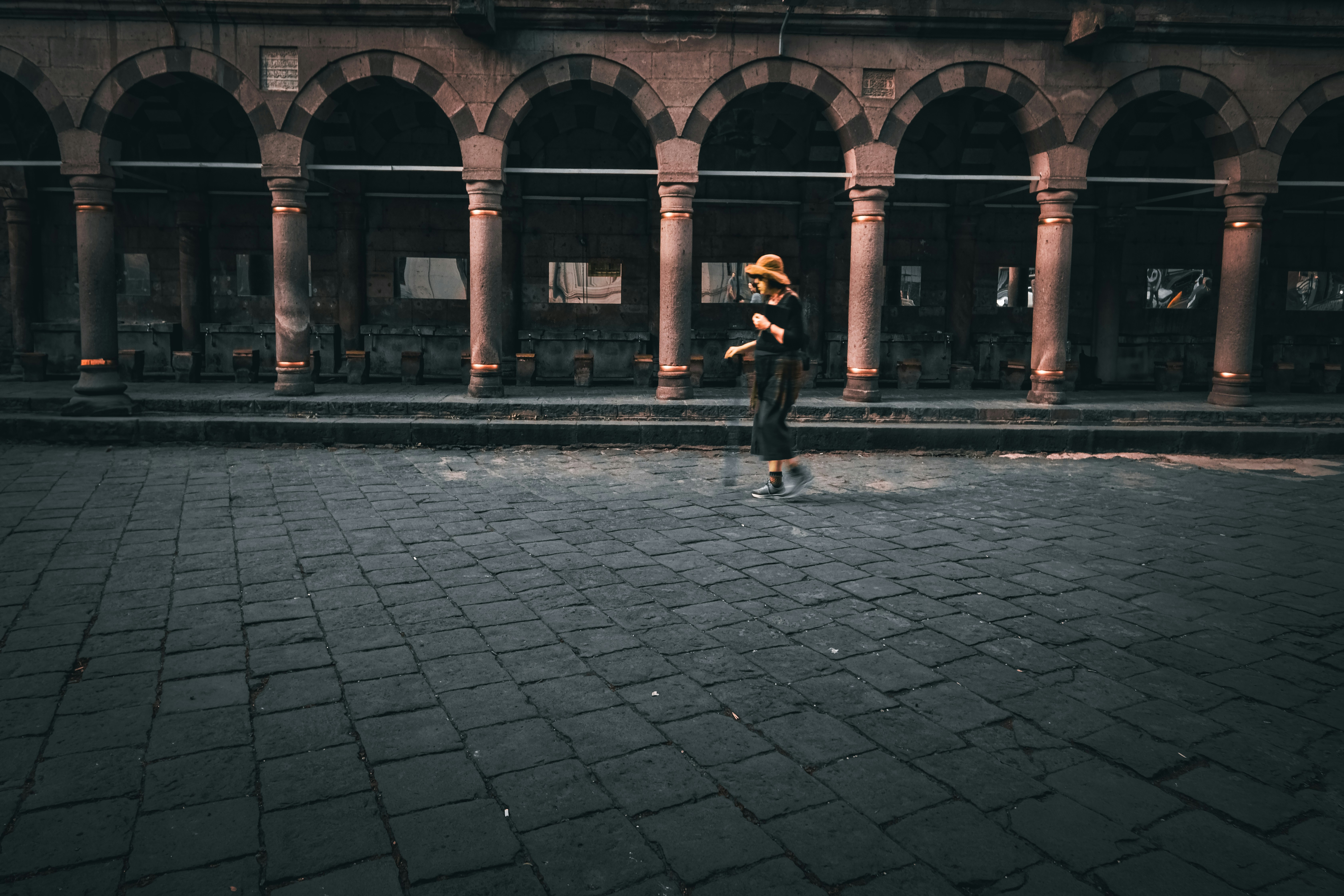 Echoes of Solitude in an Arched Passage