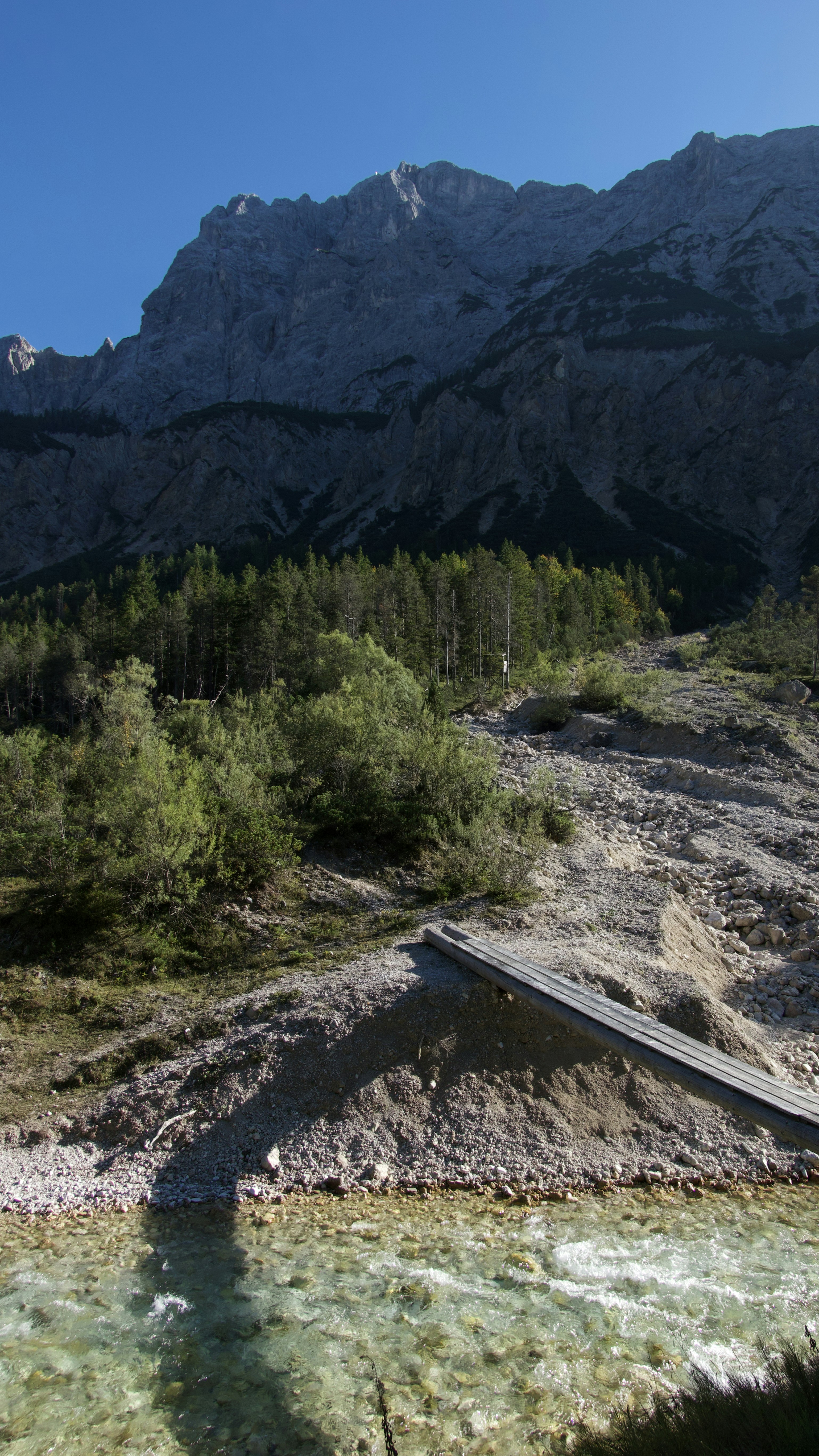 Mountain landscape with a river and a bridge