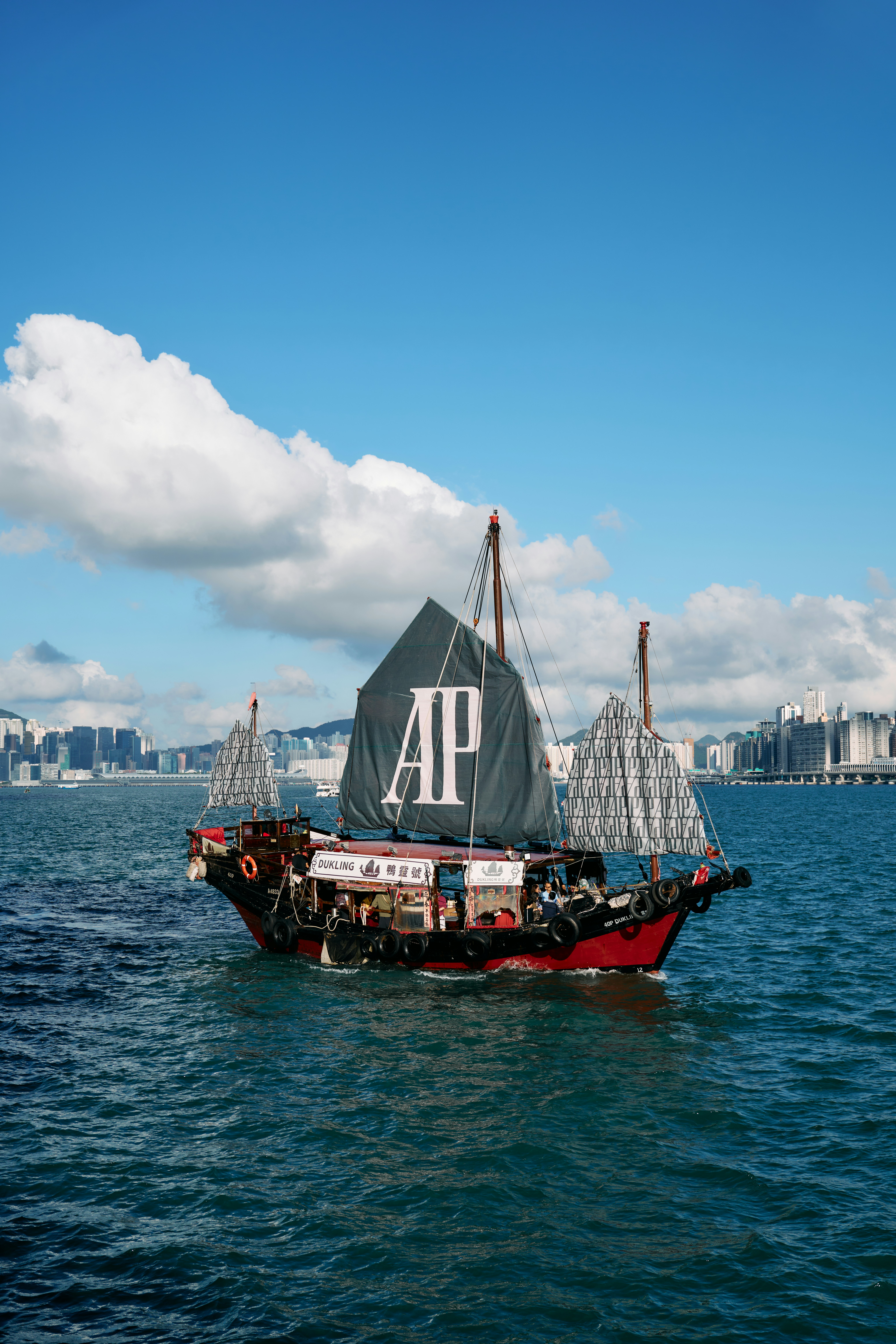 Ap Sails Across a City Wake