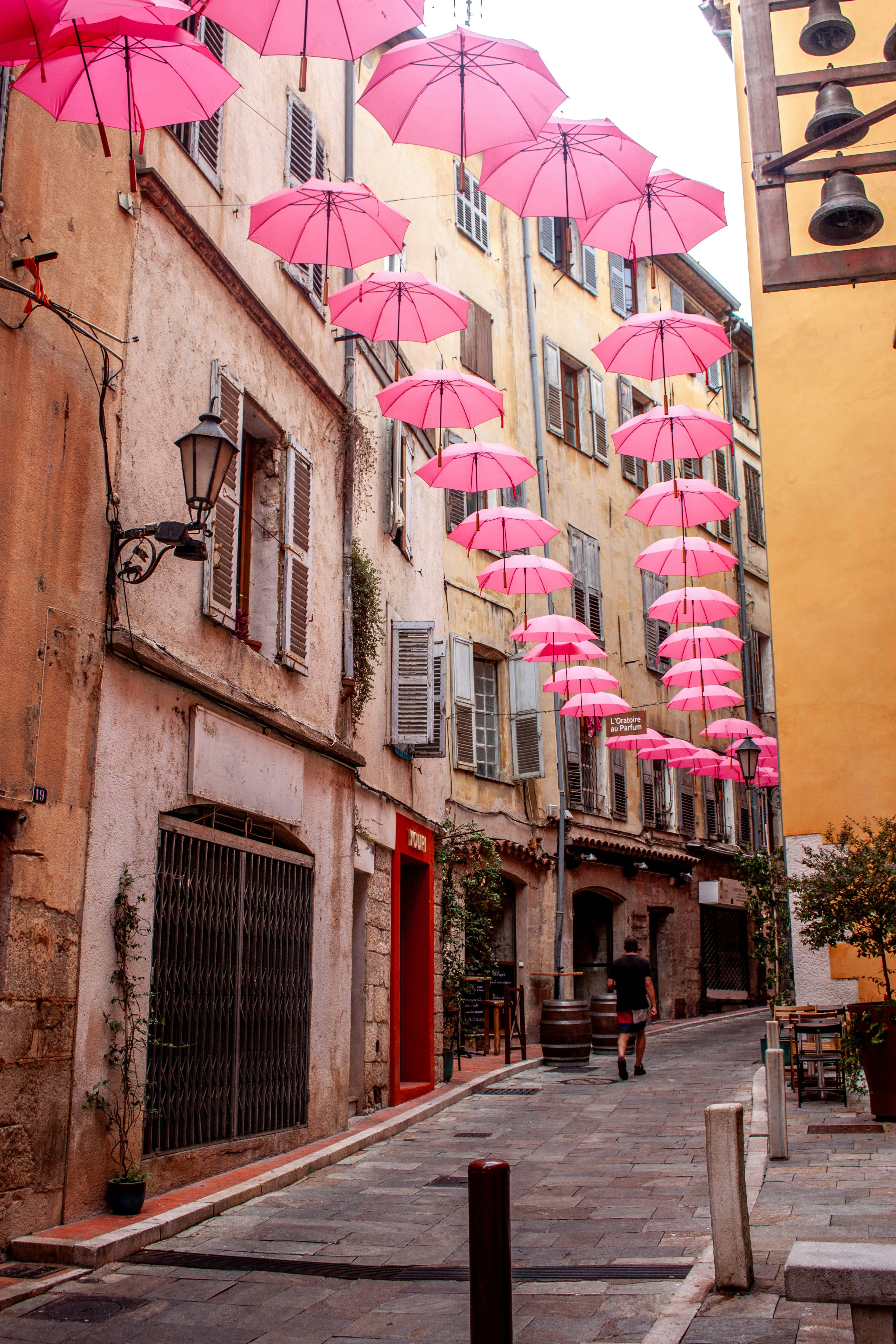 Whimsical Canopy of Color in an Enchanting Alley
