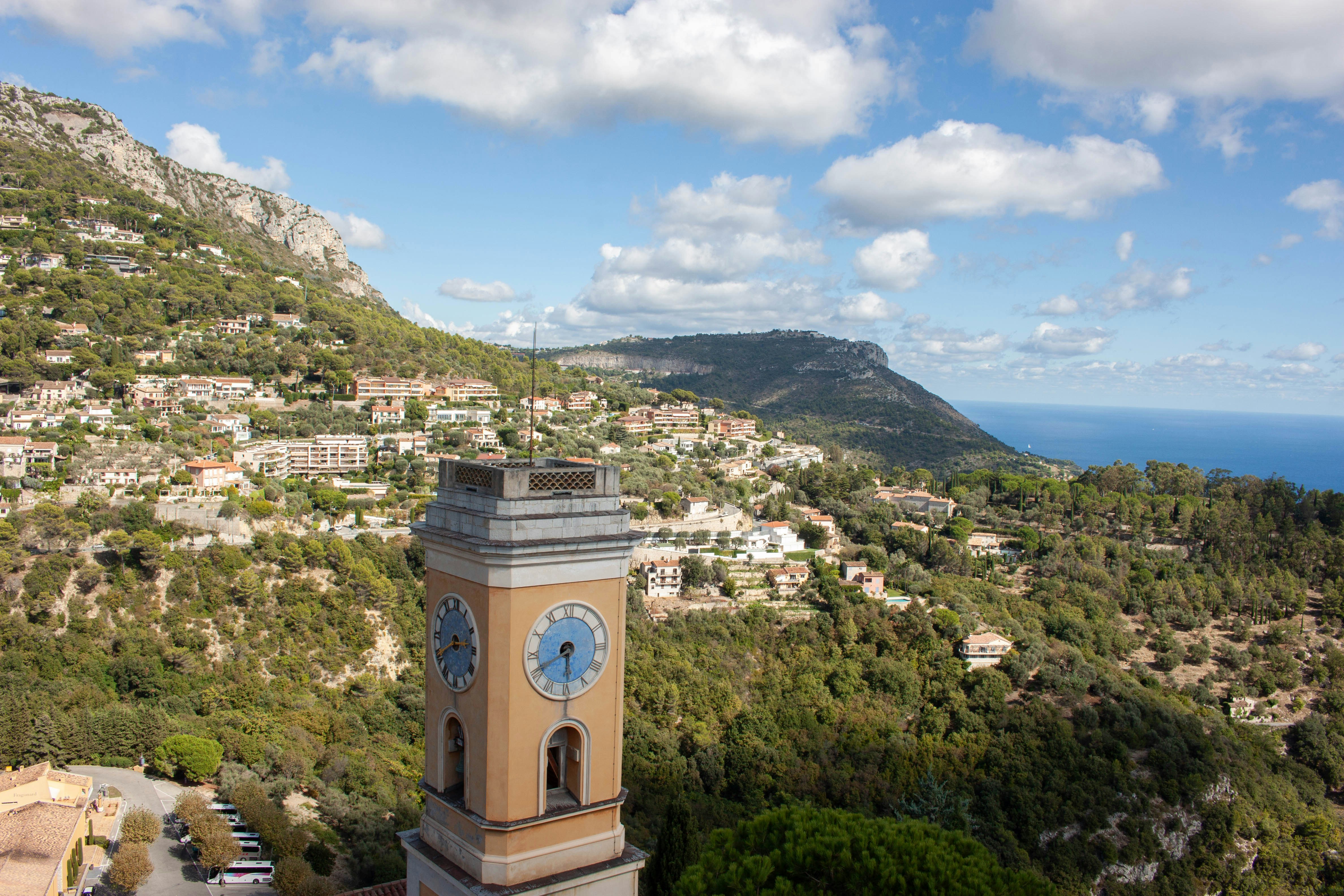 Clocktower Sentinel Over a Sunlit Mediterranean Village