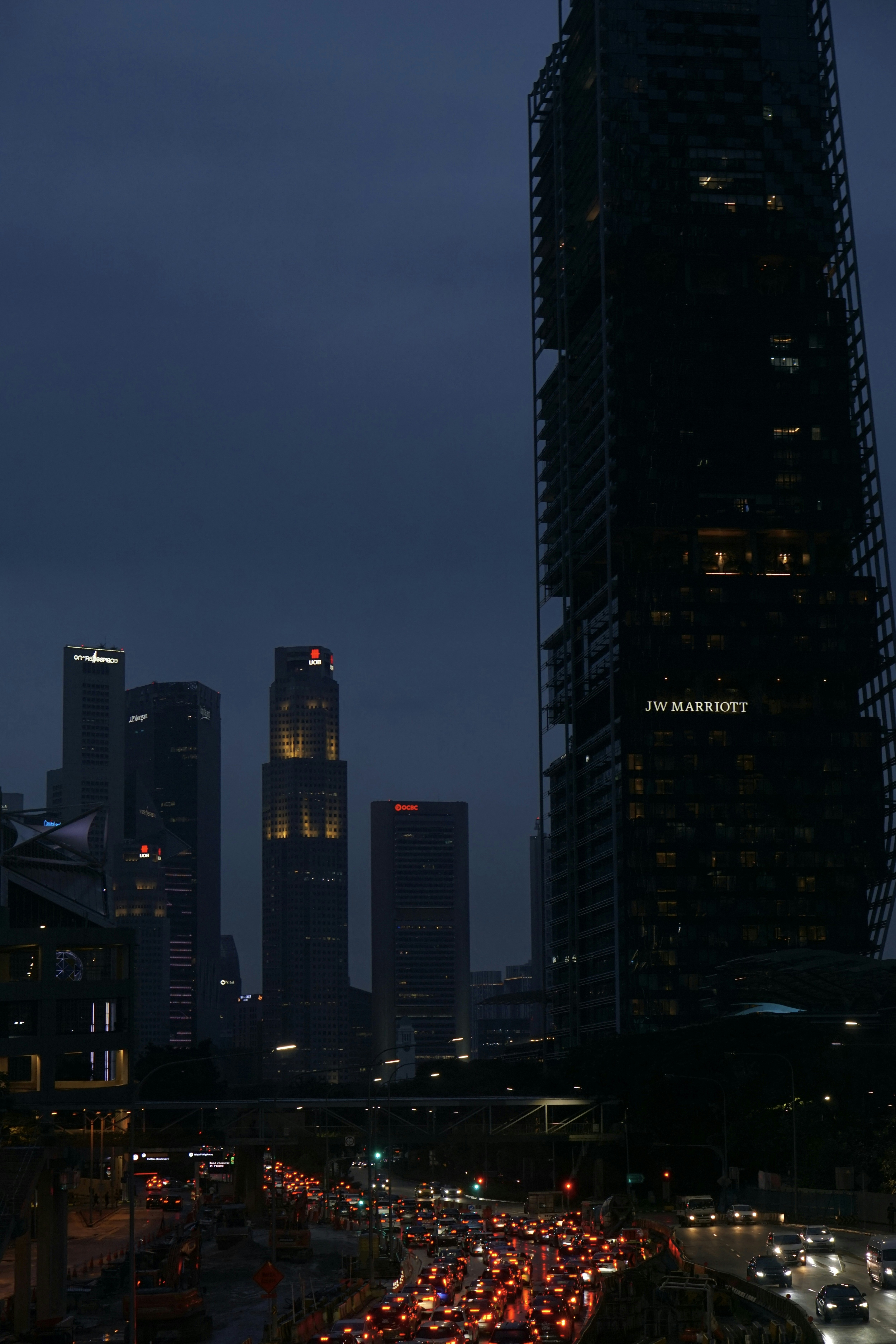 City skyline with traffic at dusk