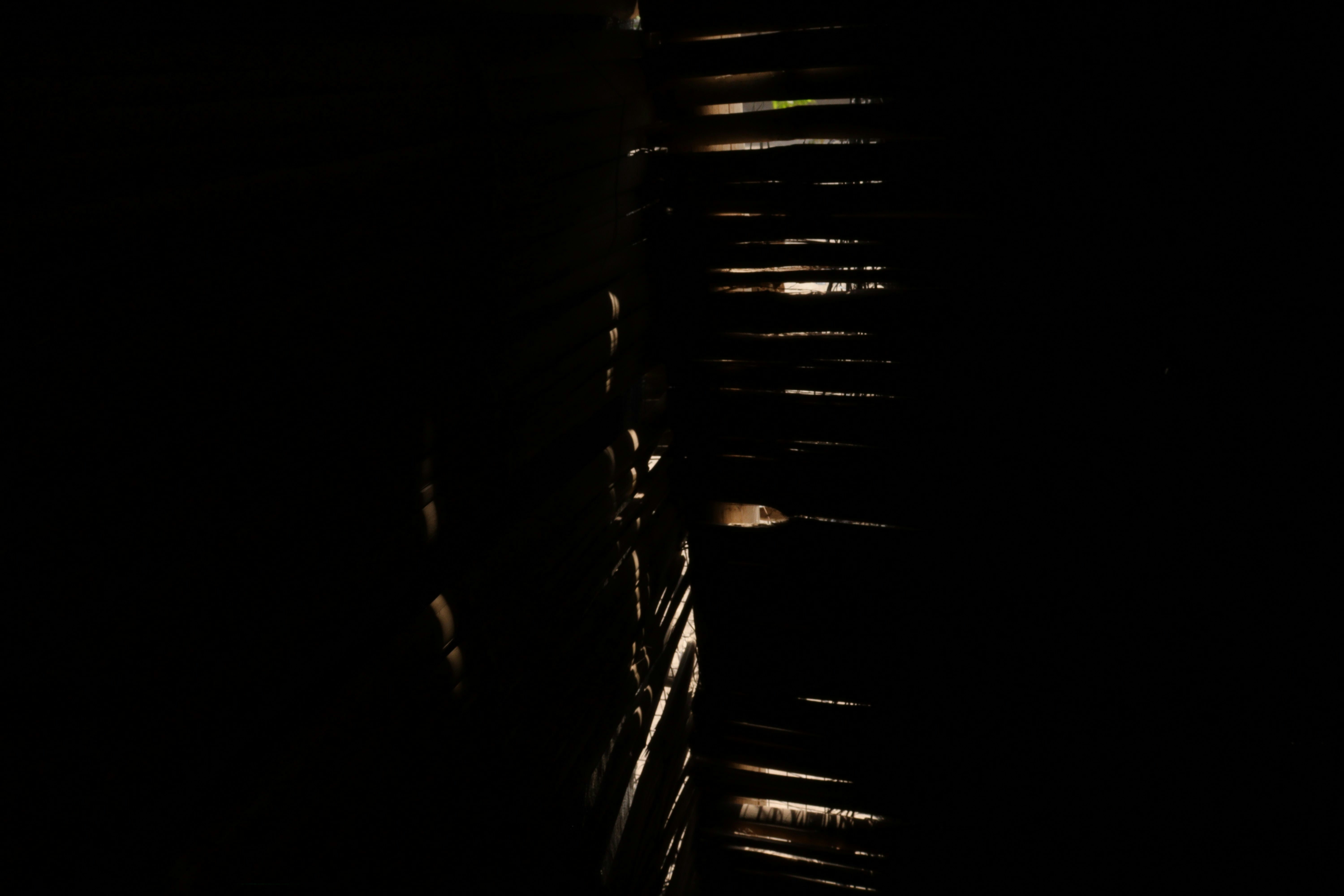 Some cracks with a bit of light to capture. | Dark abstract pattern with glowing lines