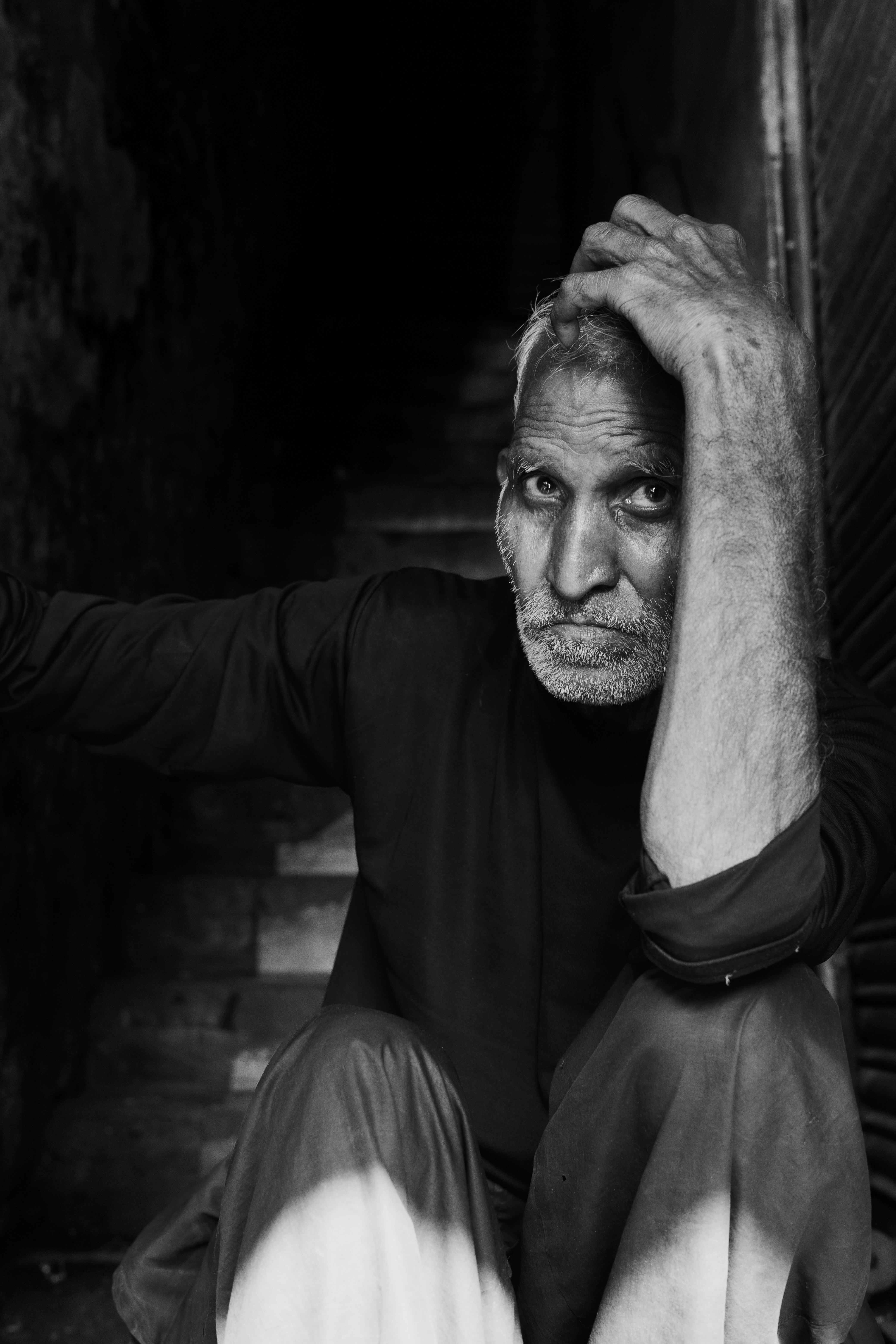 Reflections in Shadows: A Portrait of Resilience
