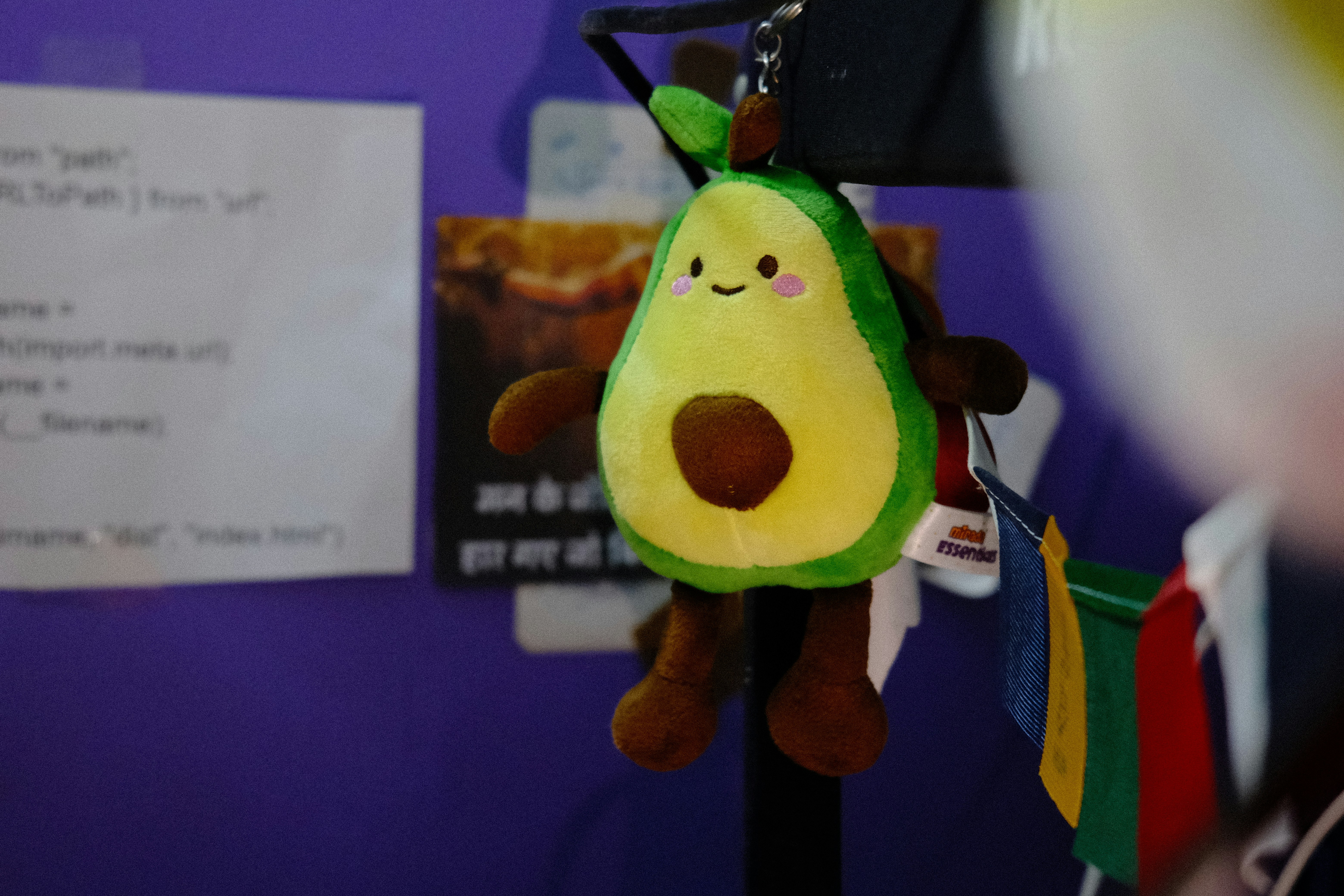Hanging Avacado Soft Toy | A plush avocado keychain with a smiling face.