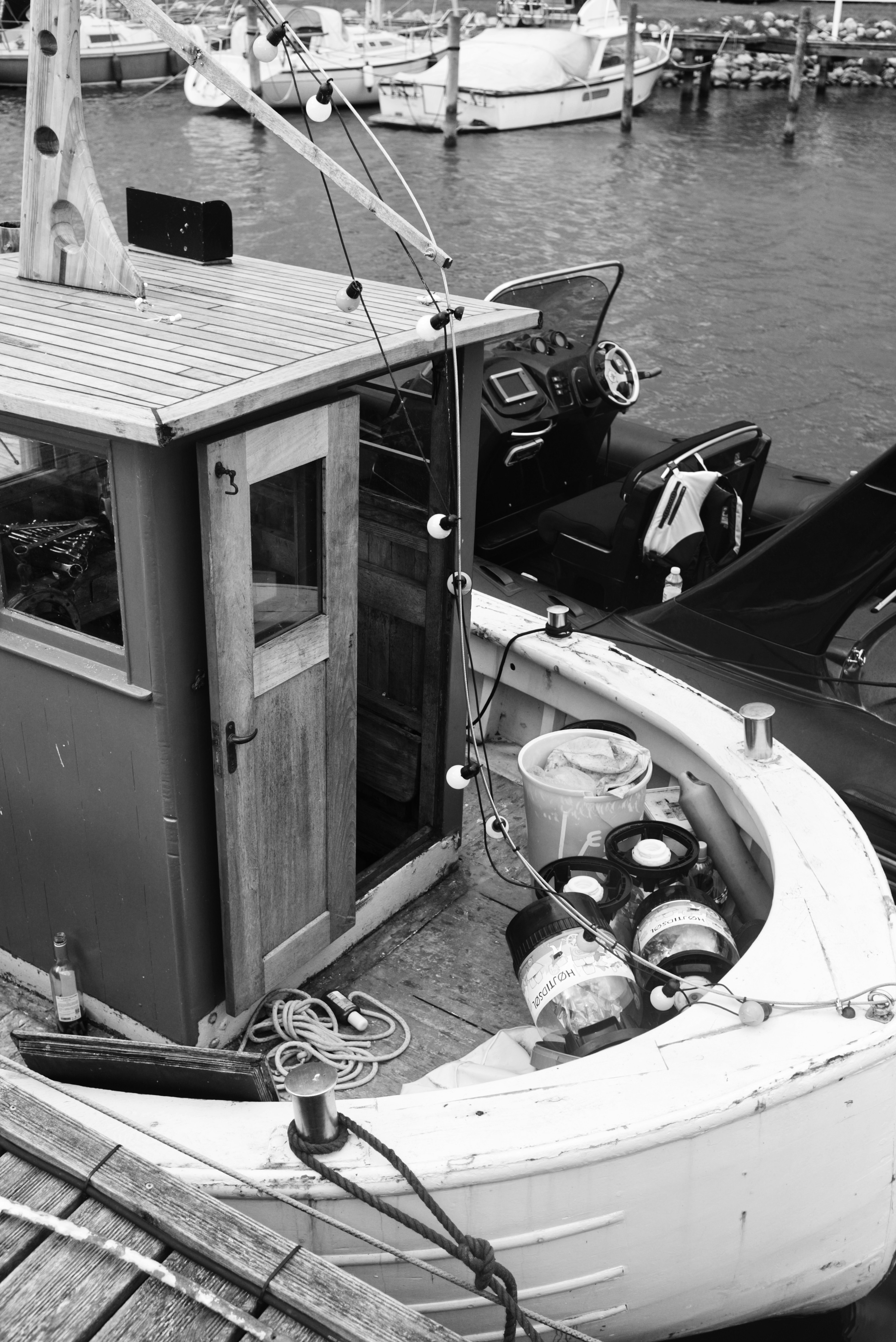 Fishing boat with buoys and equipment docked