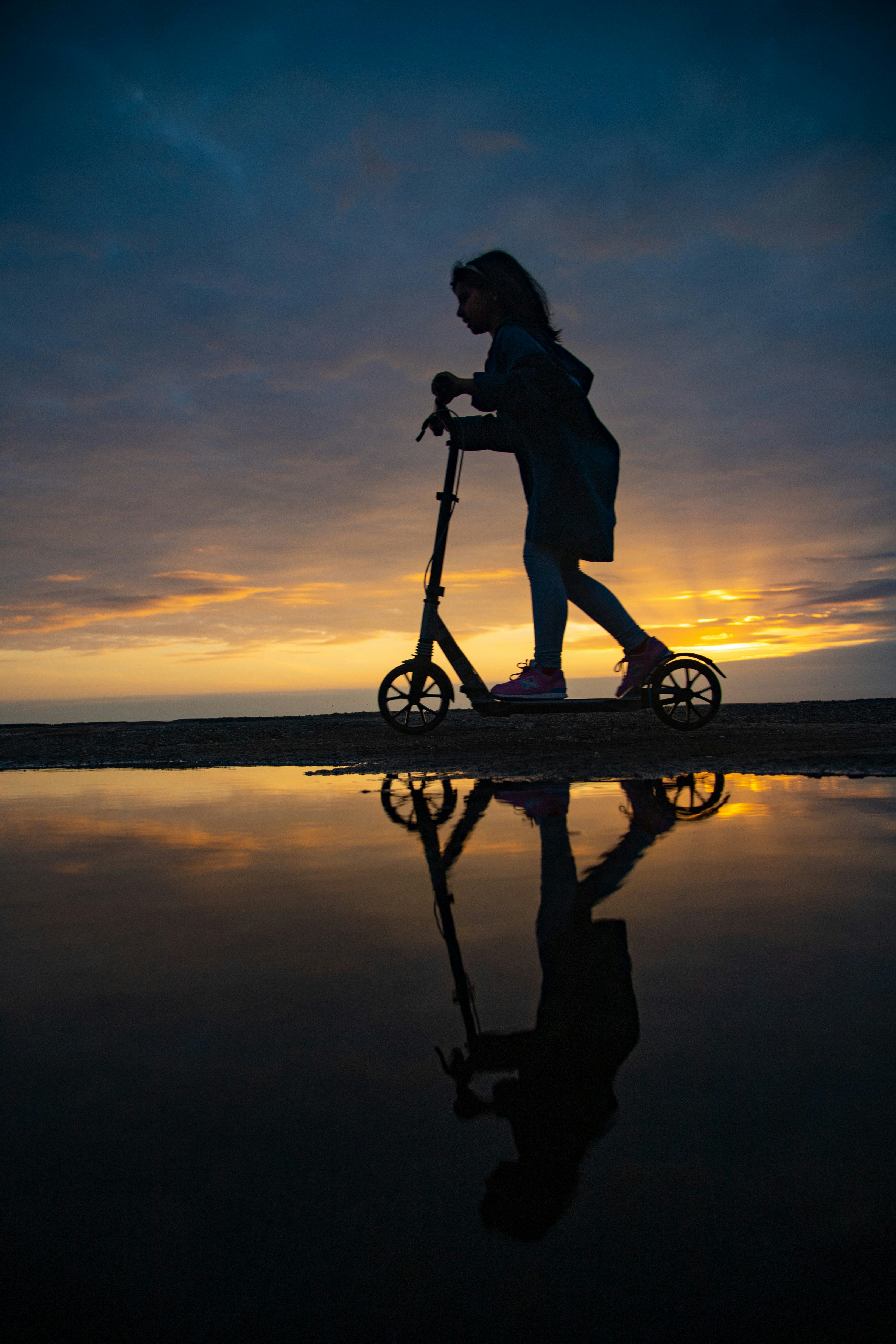 Twilight Glide: A Journey Across Reflections