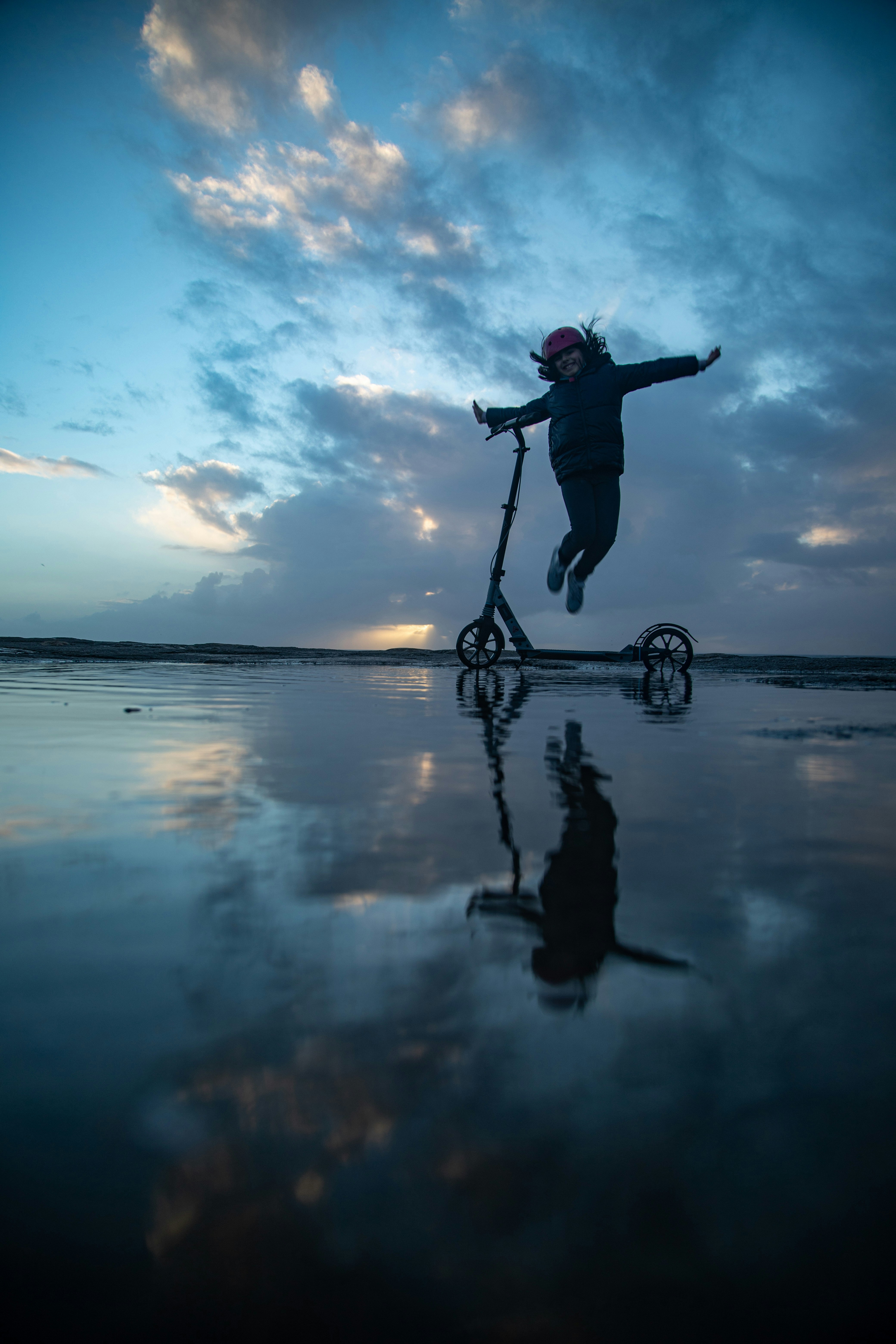 Joyful Motion Against a Reflective Canvas