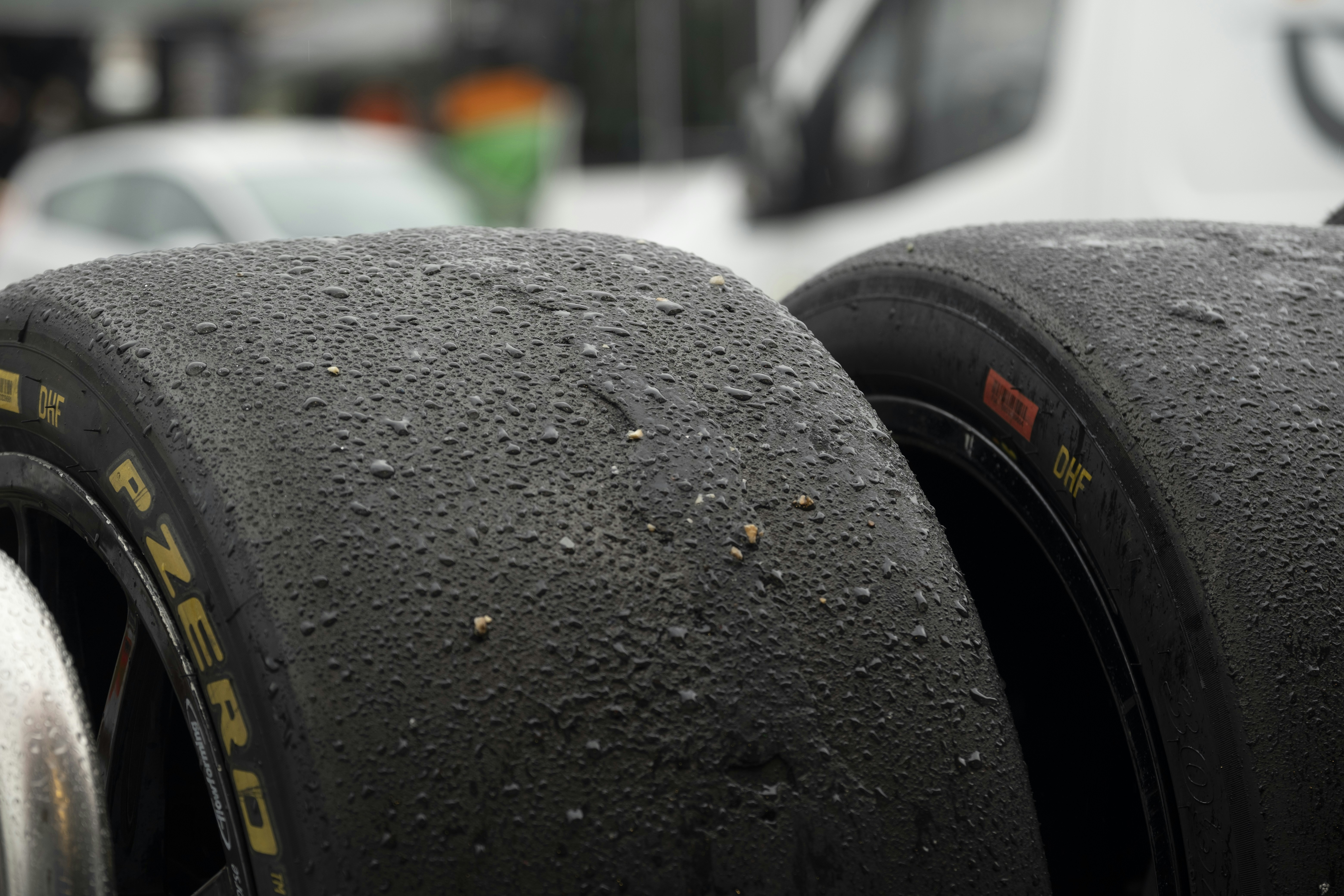 Raindrop-Studded Performance: A Close-Up on Racing Tires