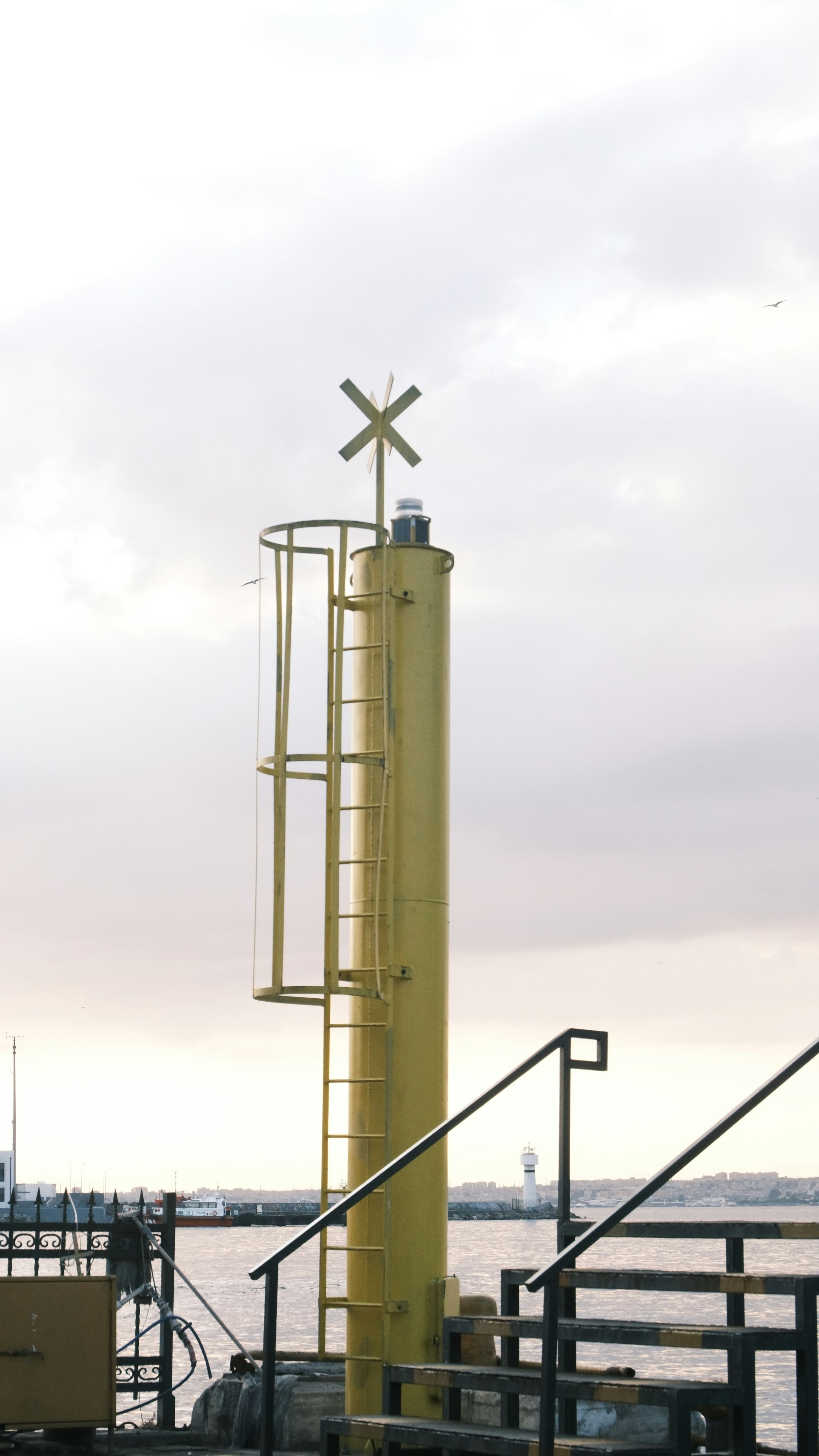 Yellow navigation tower with ladder and crossbar photo – Free Sea Image ...