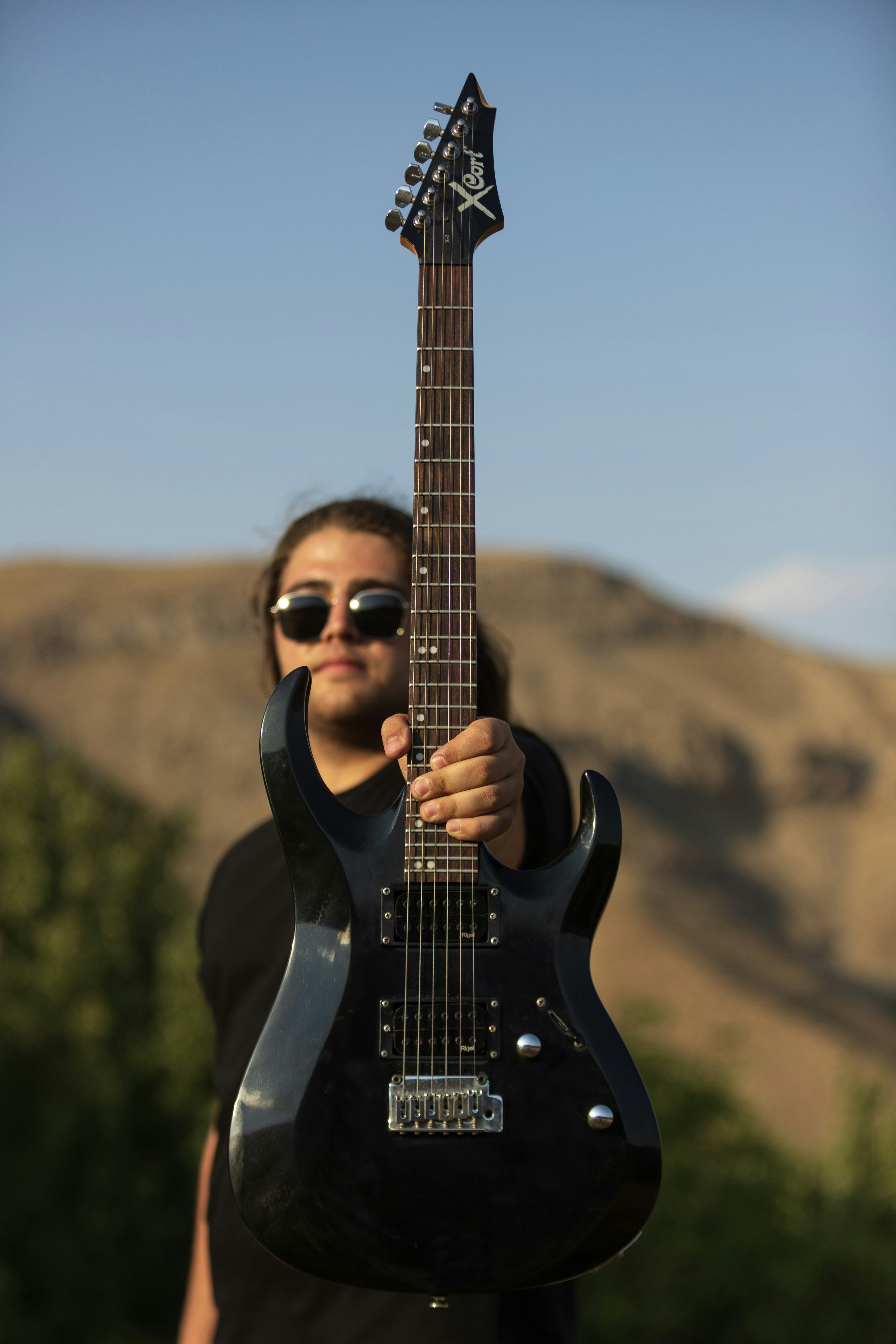 The Rocker's Anthem: Guitar in Hand
