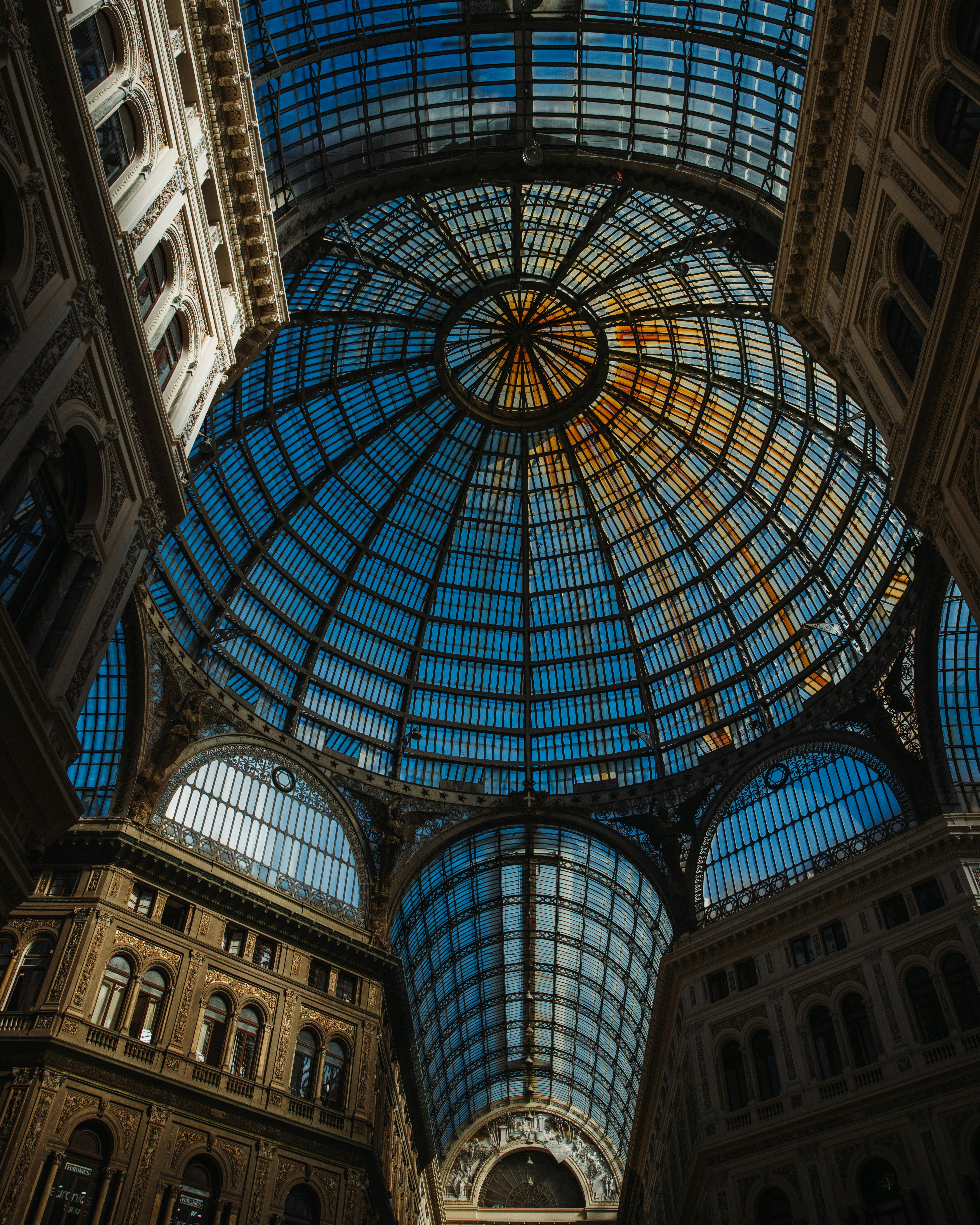 Crown of Glass: A Radiant Dome Over Marble Arches
