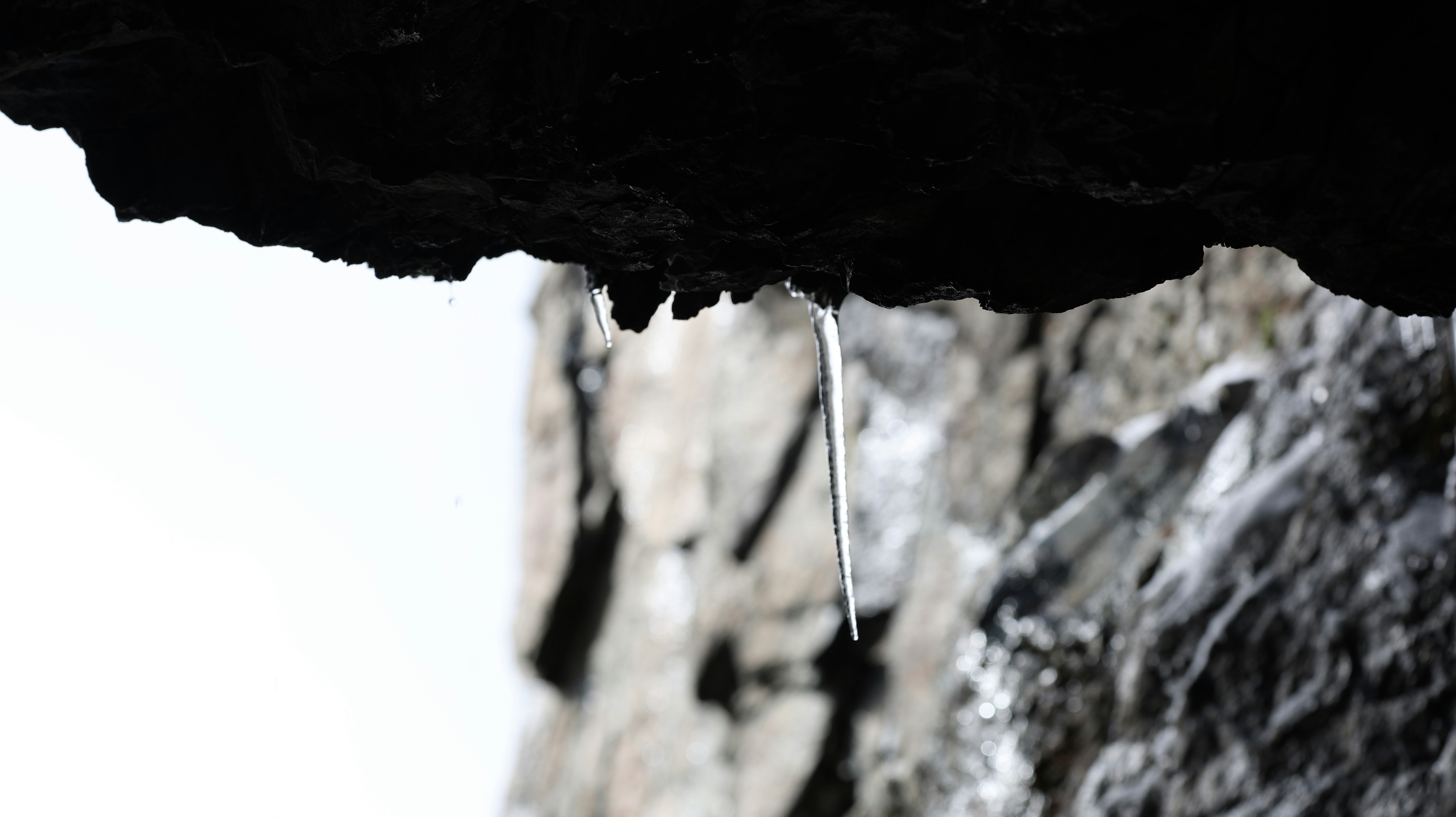 Water dripping from dark rock overhang photo – Free Weather Image on ...