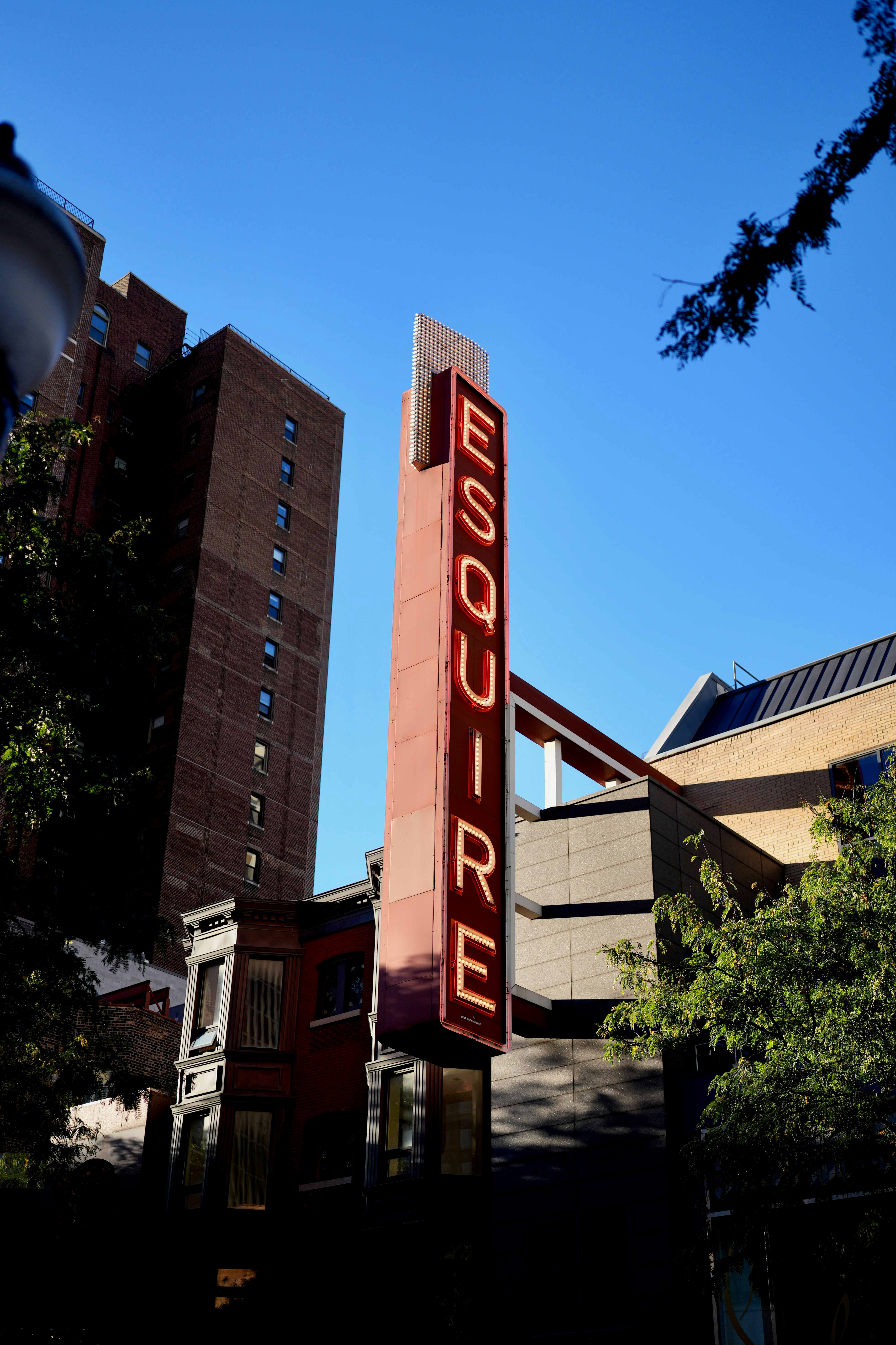 Esquire sign on a building