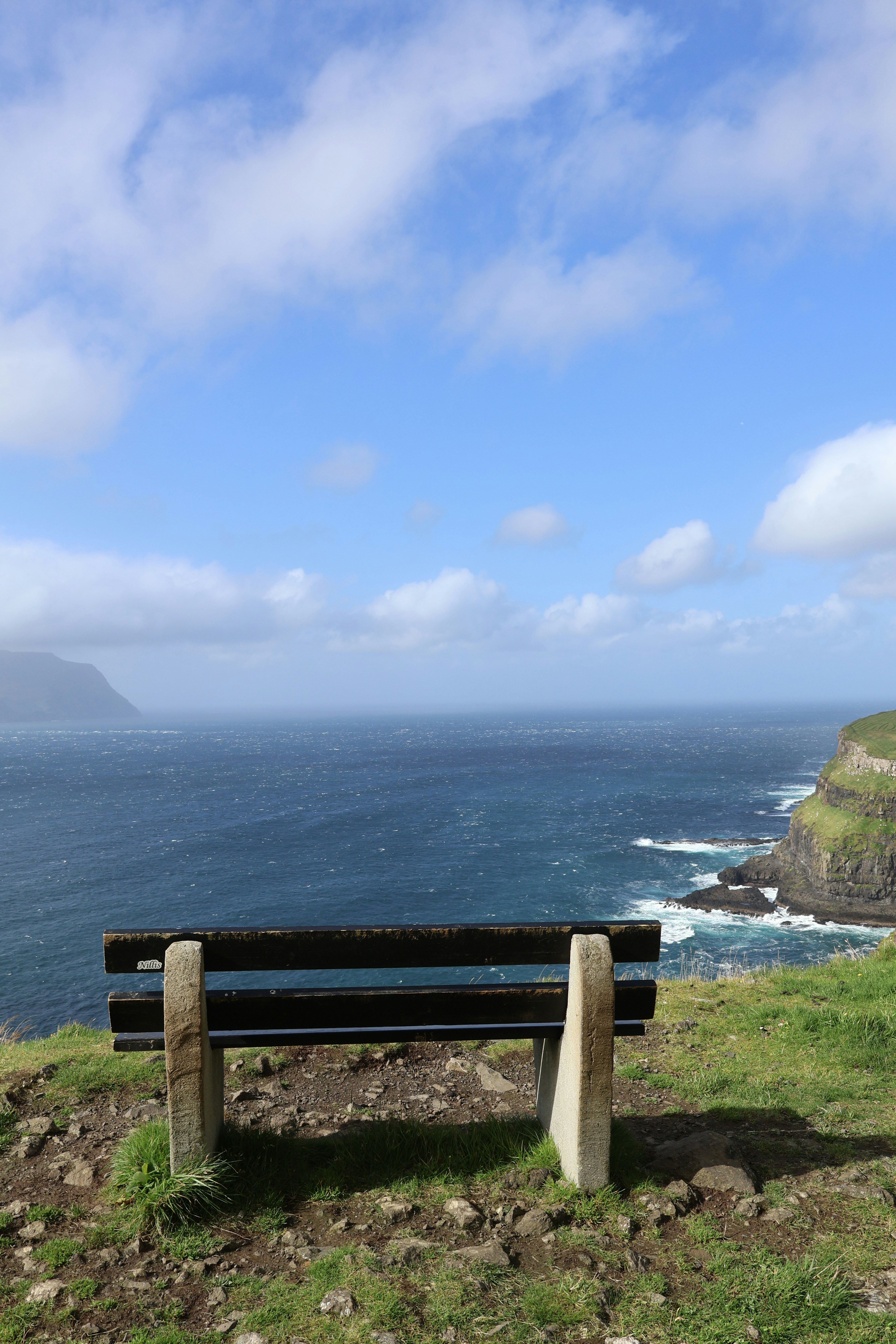 Seaside Solitude: A Bench with a View