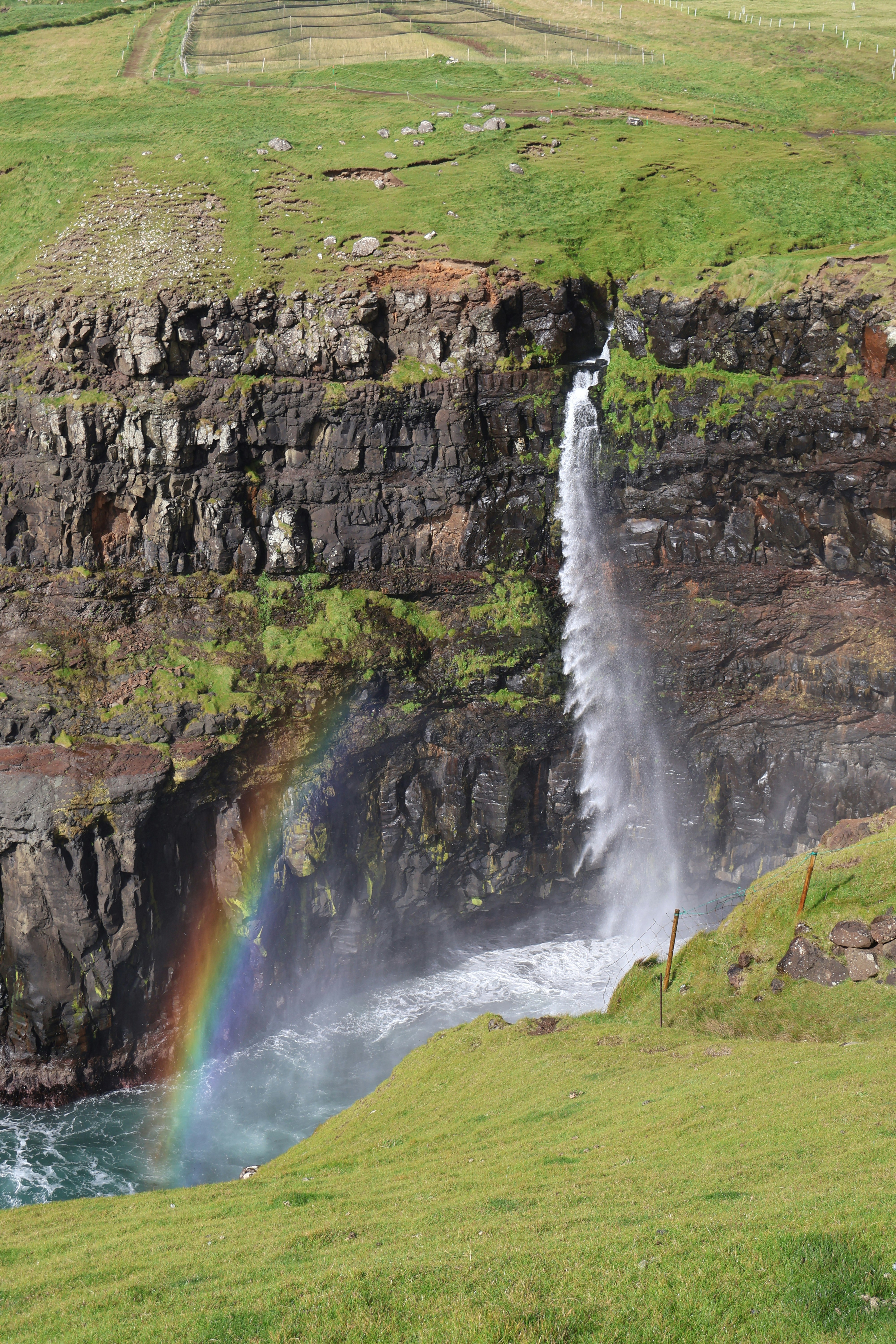 Whispers of the Waterfall: A Rainbow's Embrace