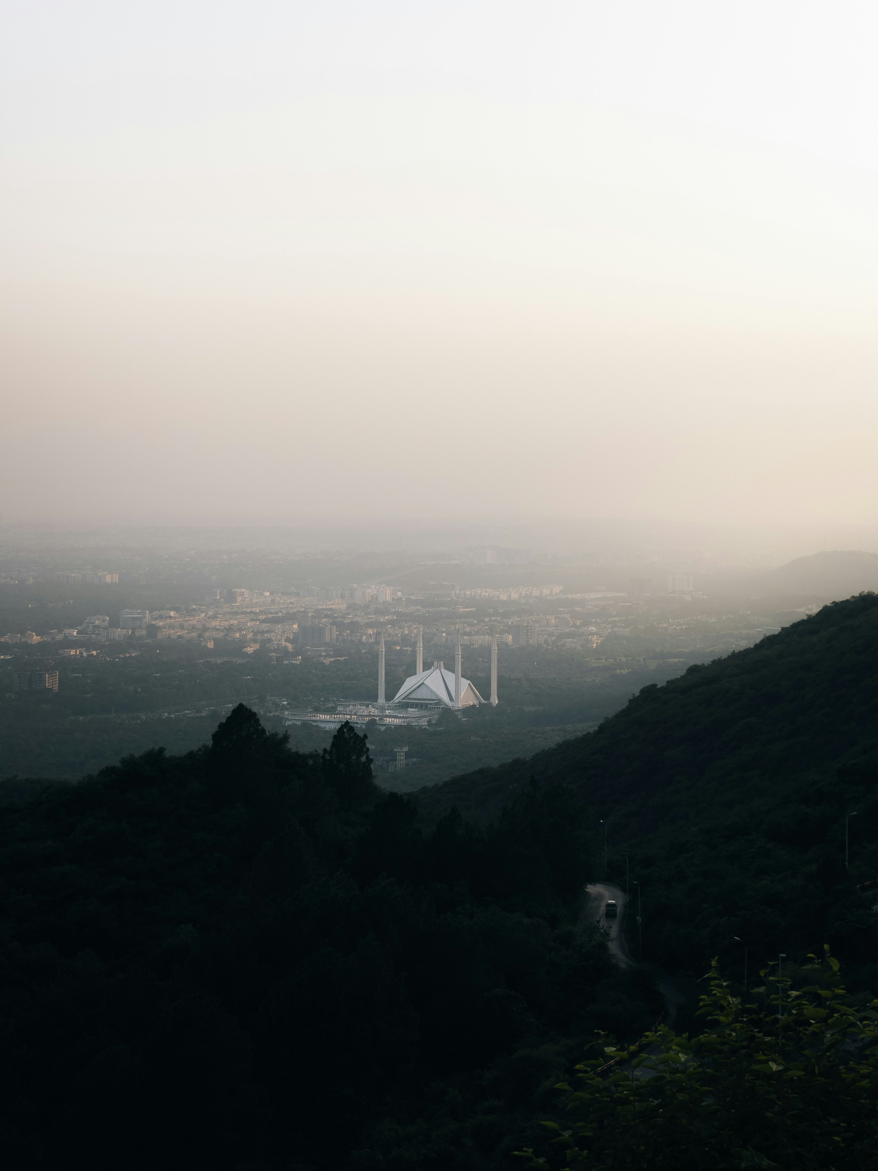 View of the Faisal Mosque from Monal, Islamabad, Pakistan. 📸 iPhone 14 Pro Max | Faisal mosque in islamabad, pakistan at dusk.