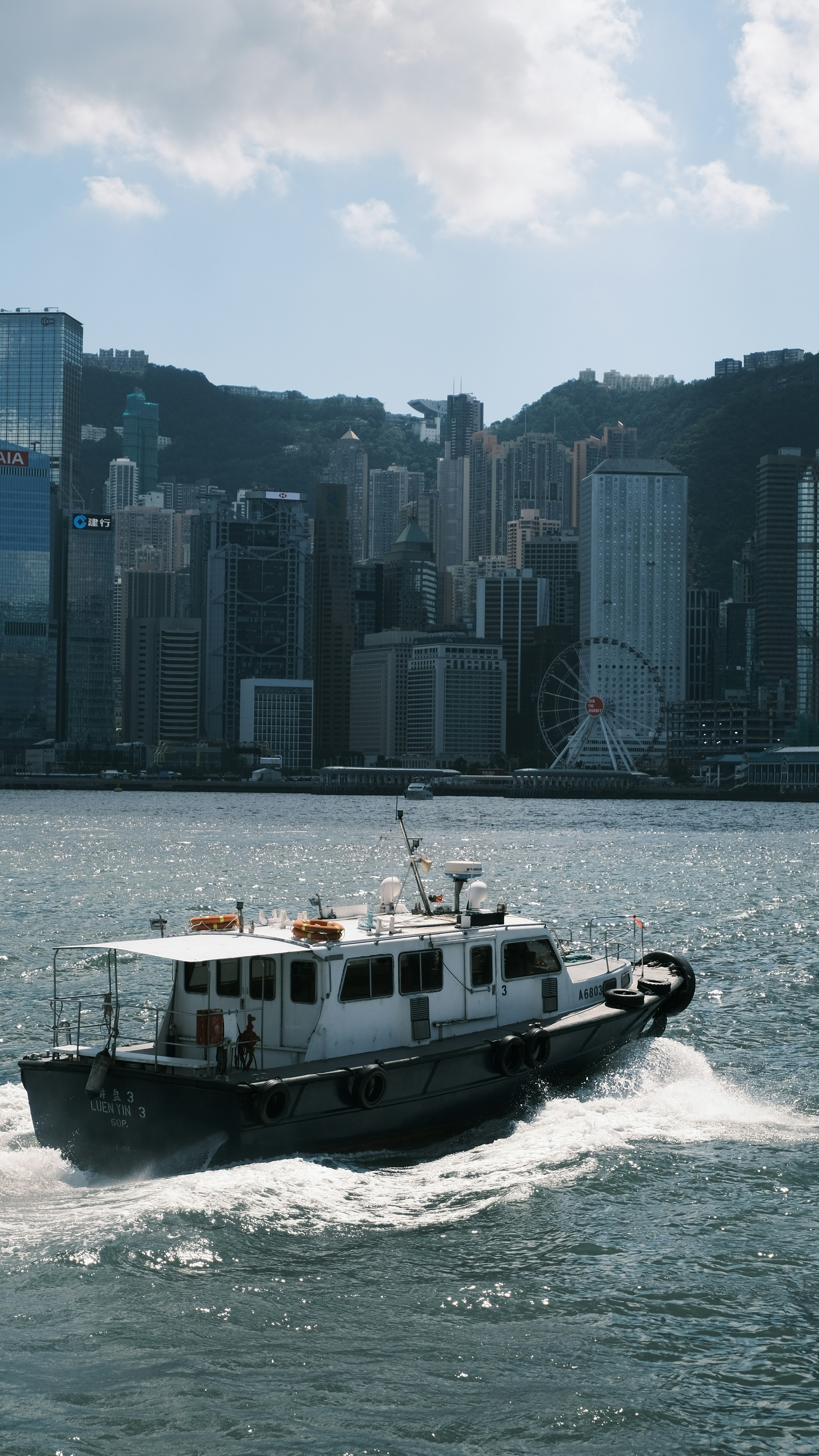 Urban Drift: A Vessel Amidst the Skyline