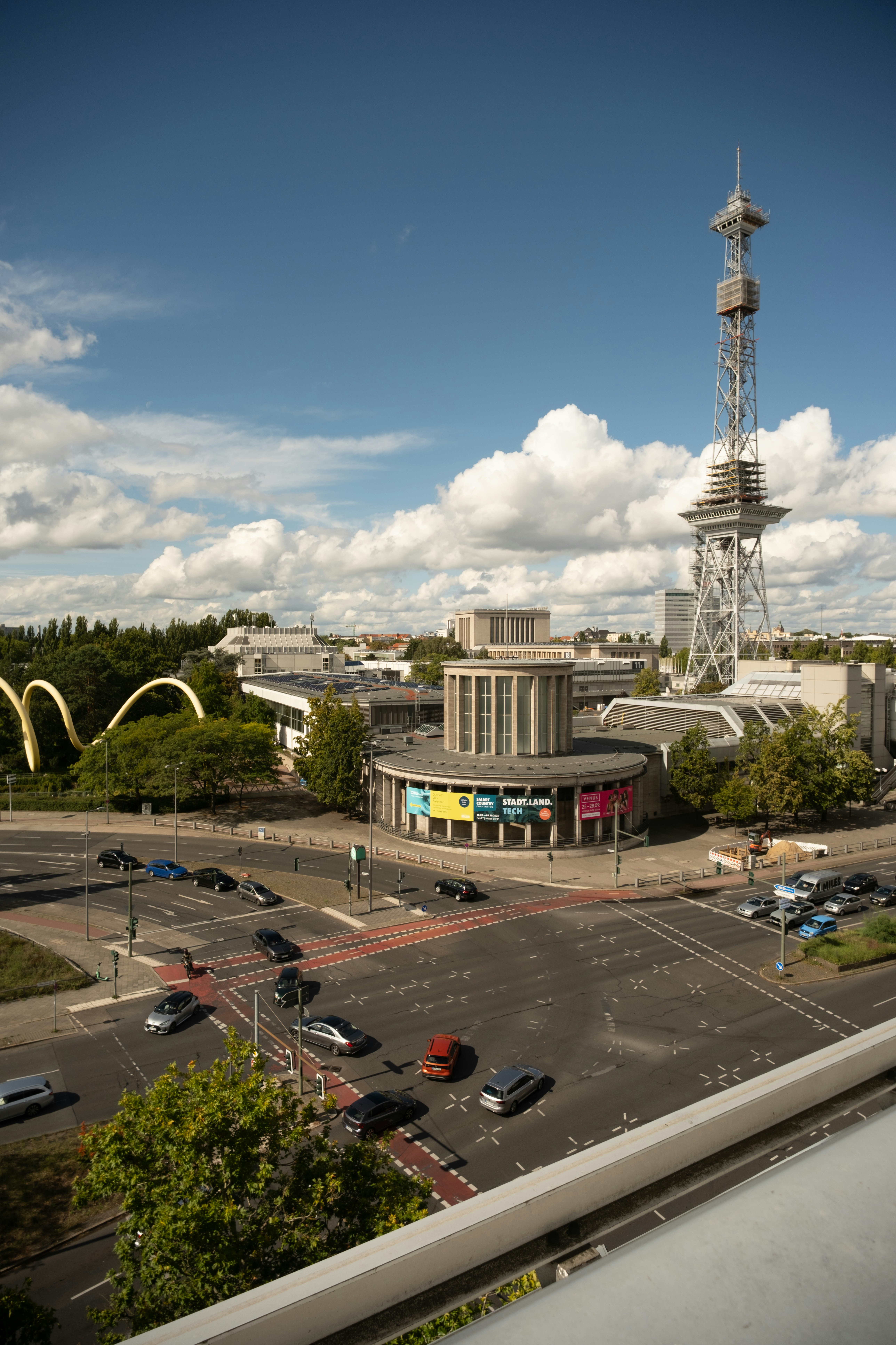 City intersection with a tall tower and buildings