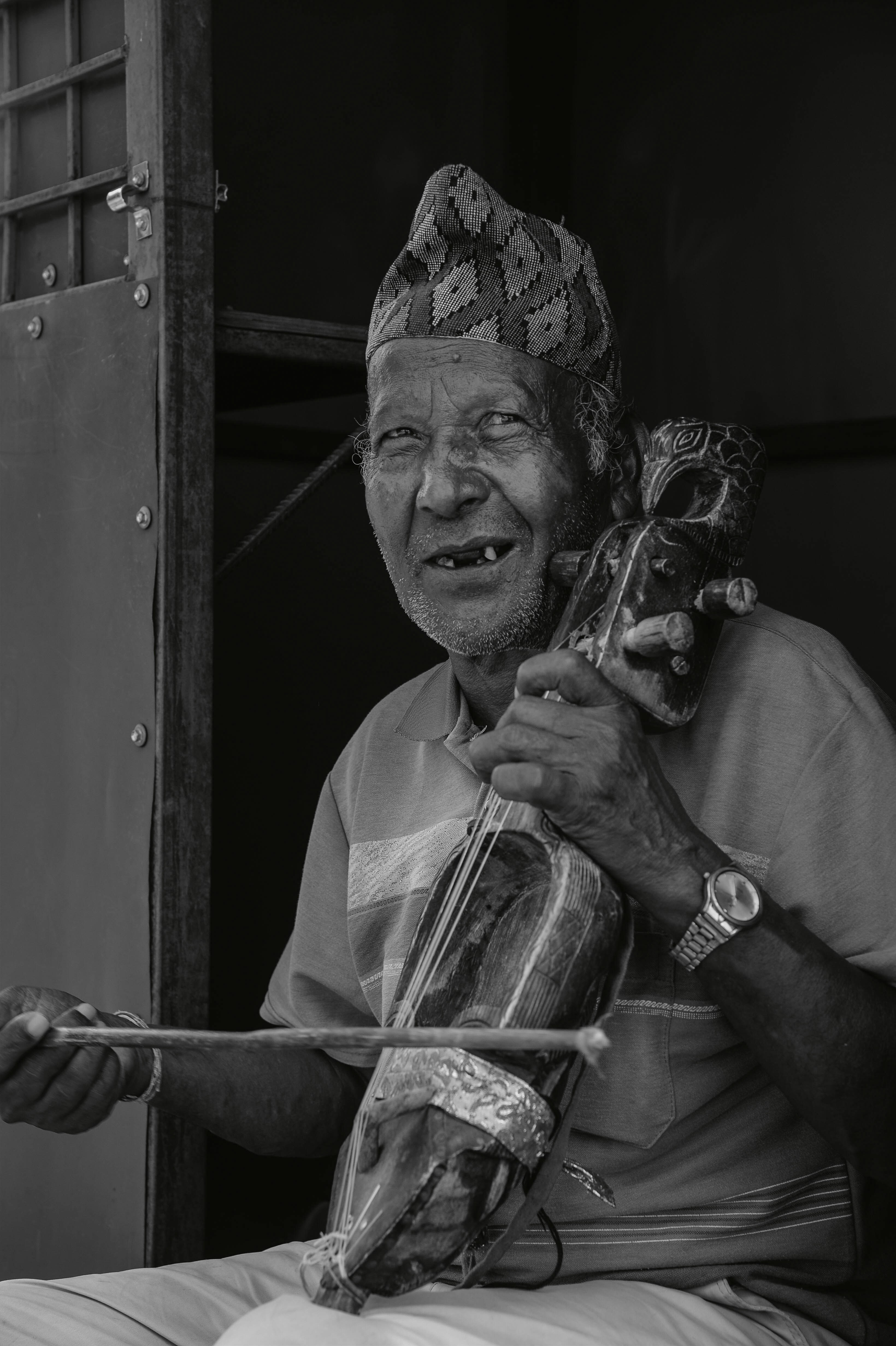 Elderly man playing a traditional stringed instrument photo – Free ...
