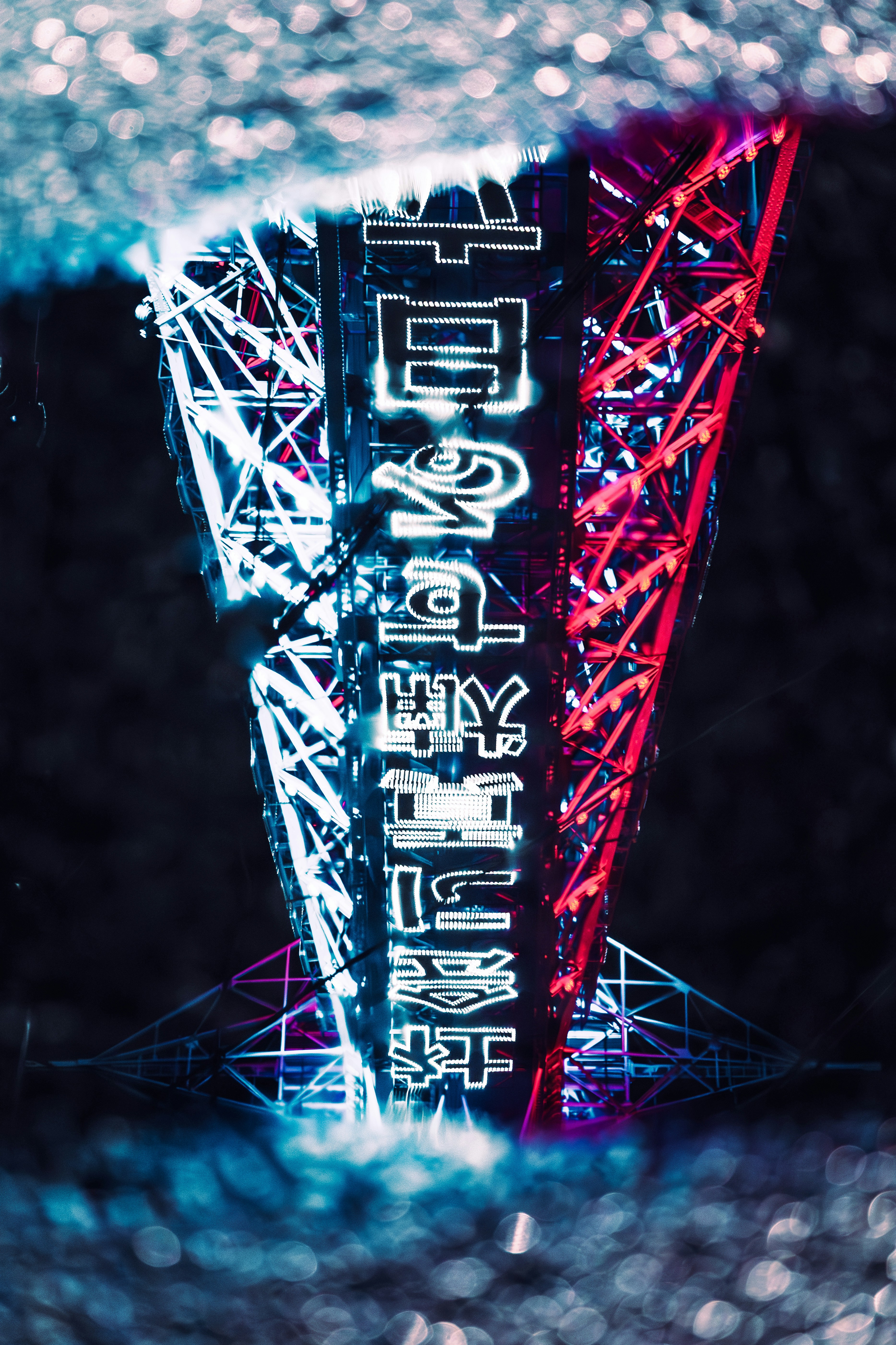 Neon Lightning Tower: An Electric Night at the Amusement Spine