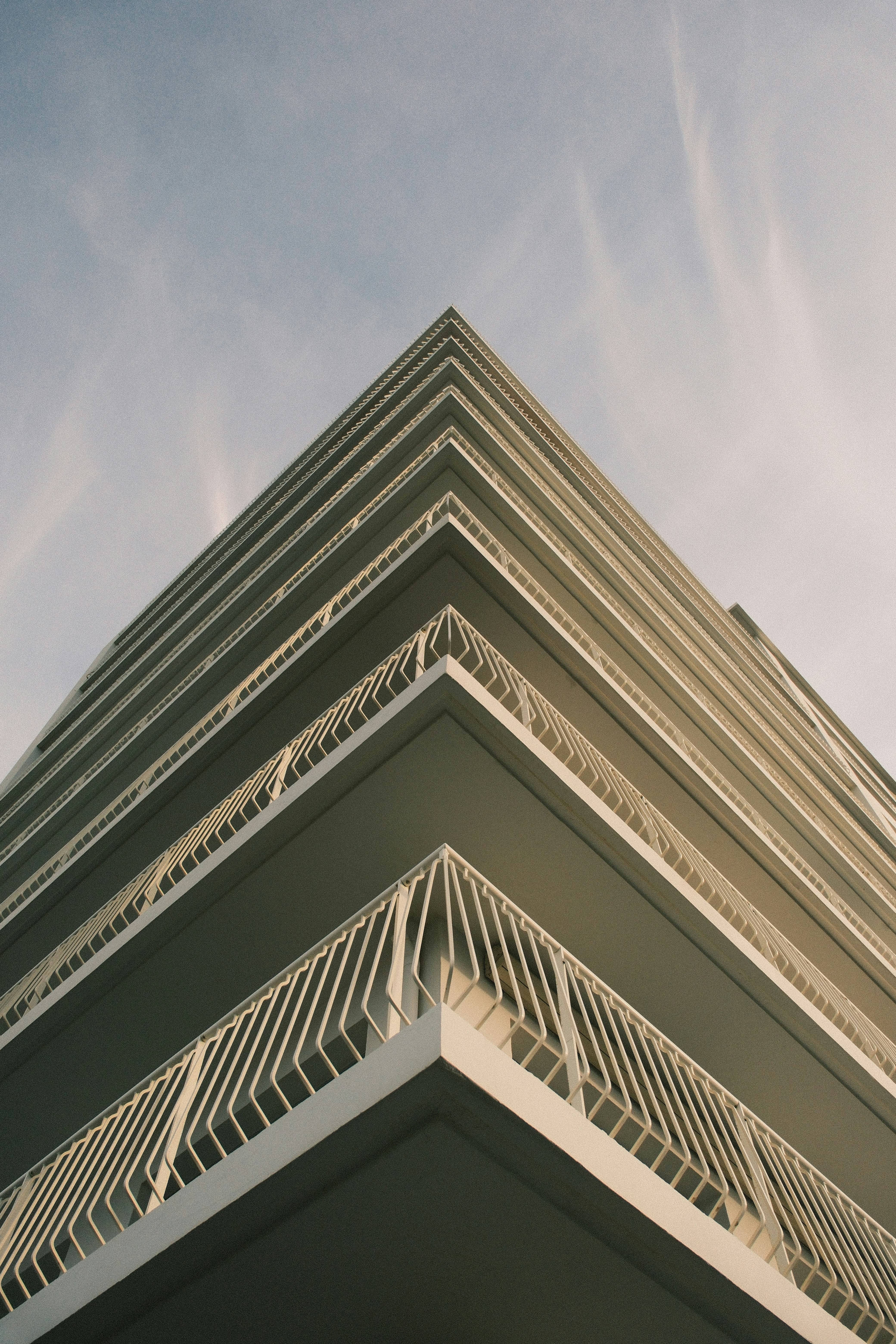Modern building with balconies against a sky.
