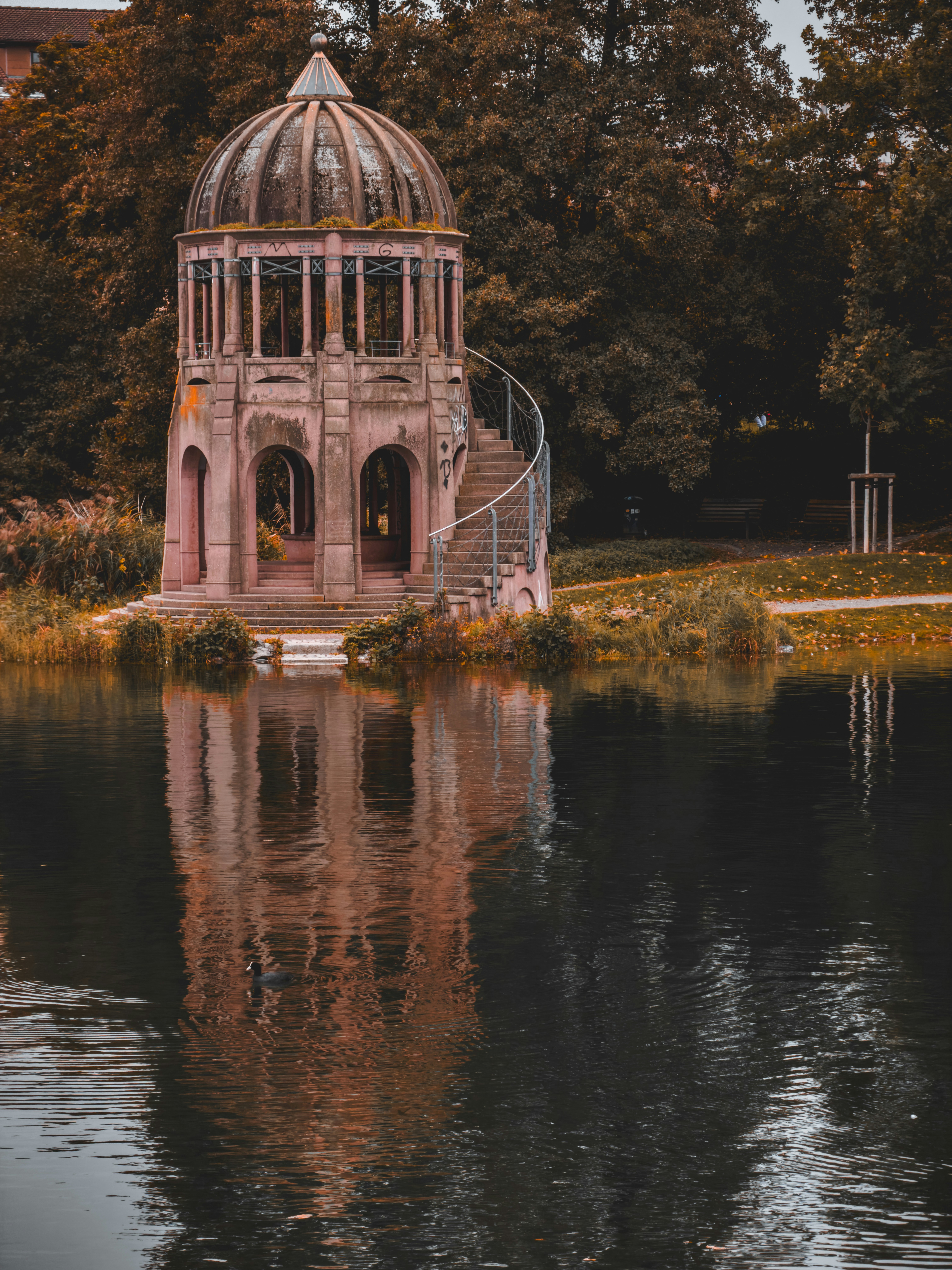 Whispers of Tranquility: The Gazebo by the Water