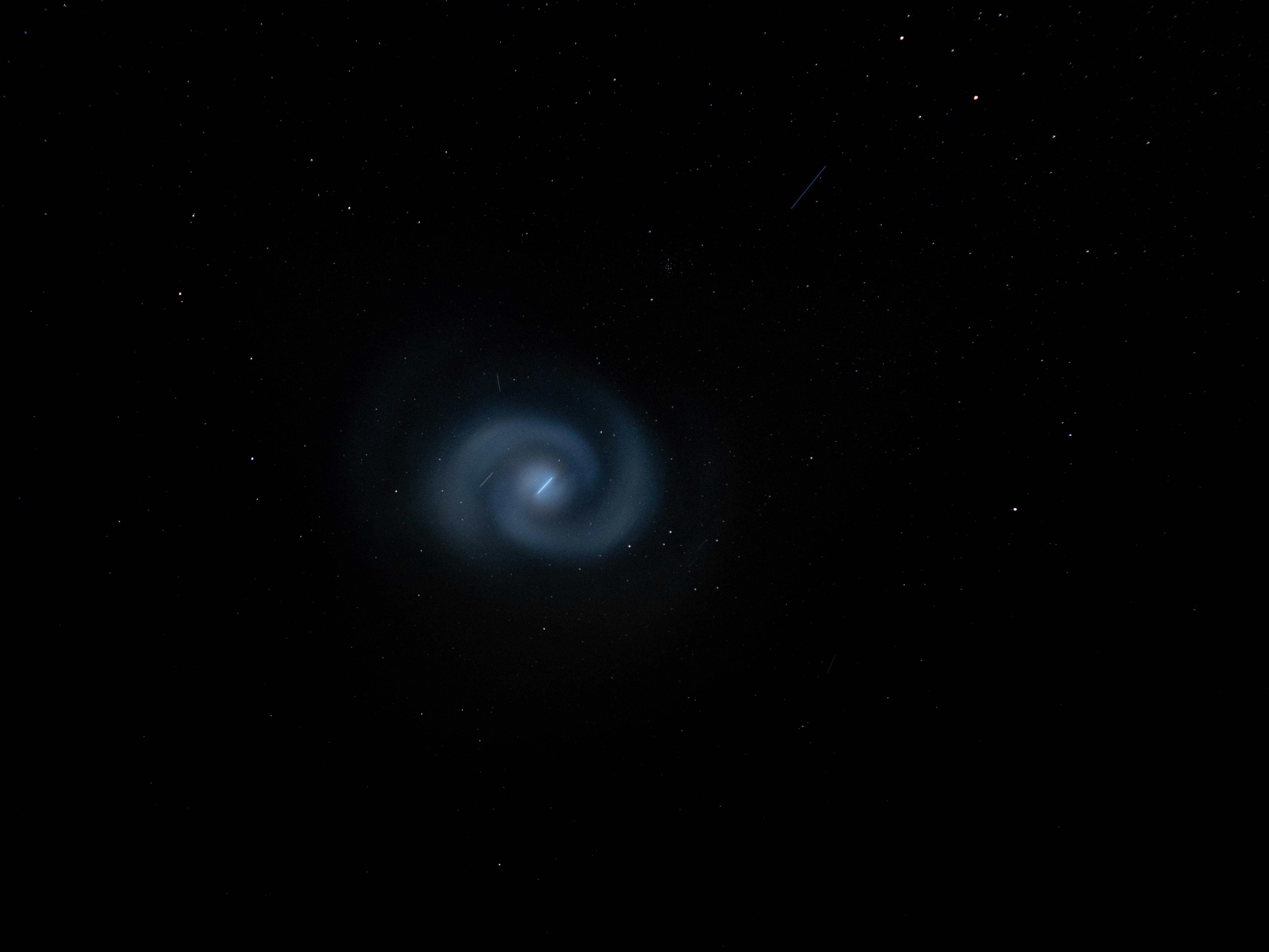 Whispers of the Cosmos: A Celestial Spiral