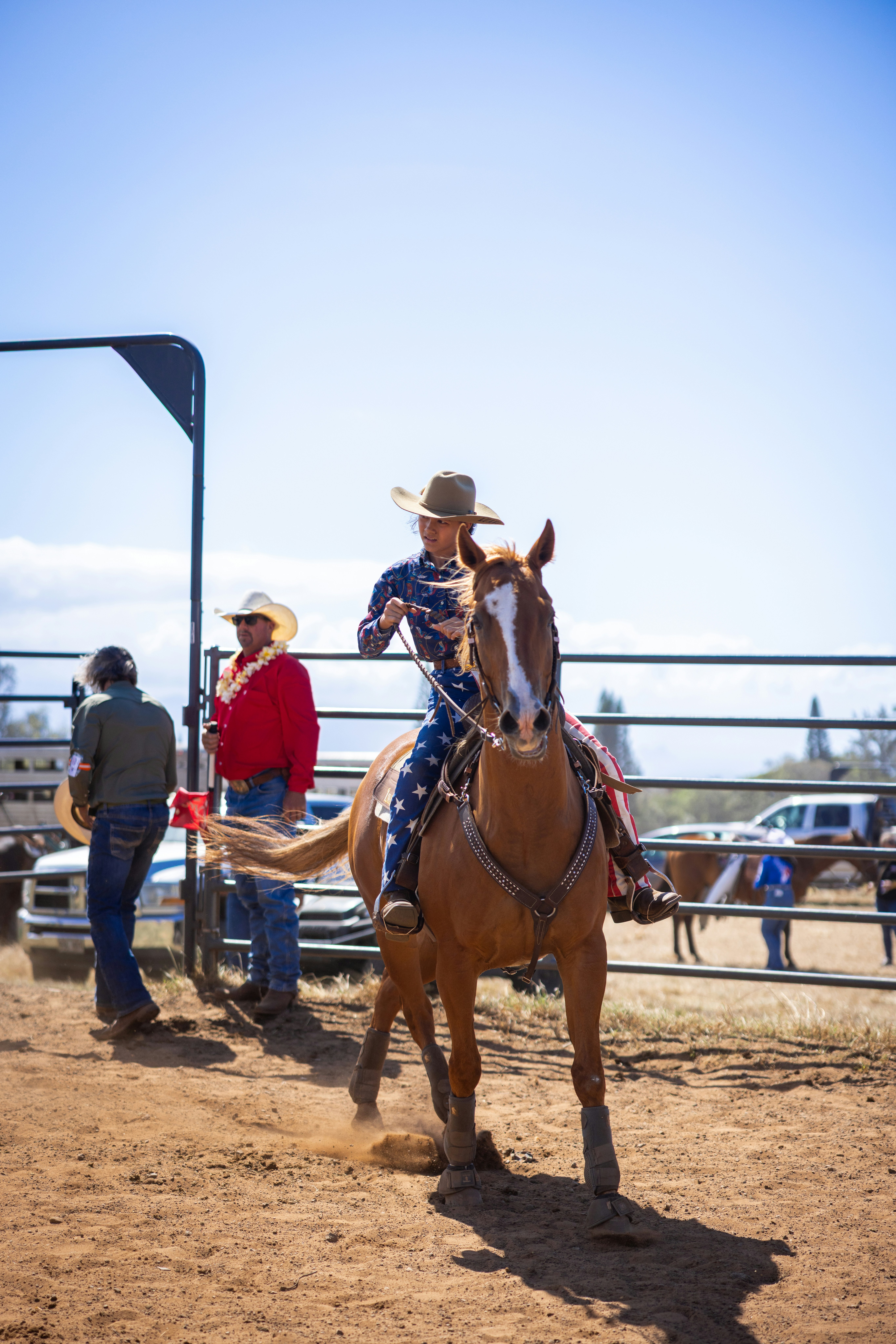 Star-Patterned Rider Surges Across the Dusty Arena