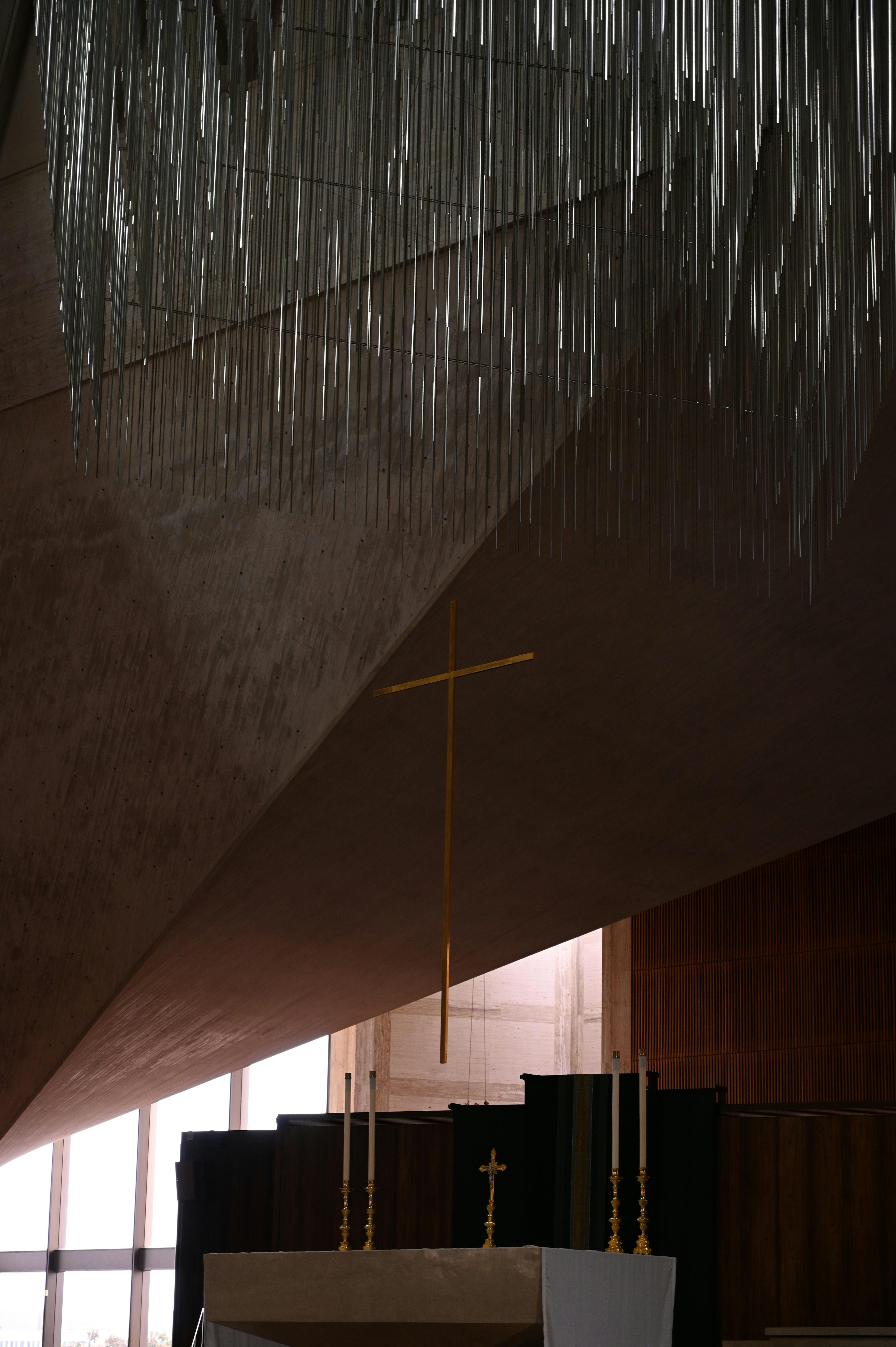 Altar with candles and cross in a modern church