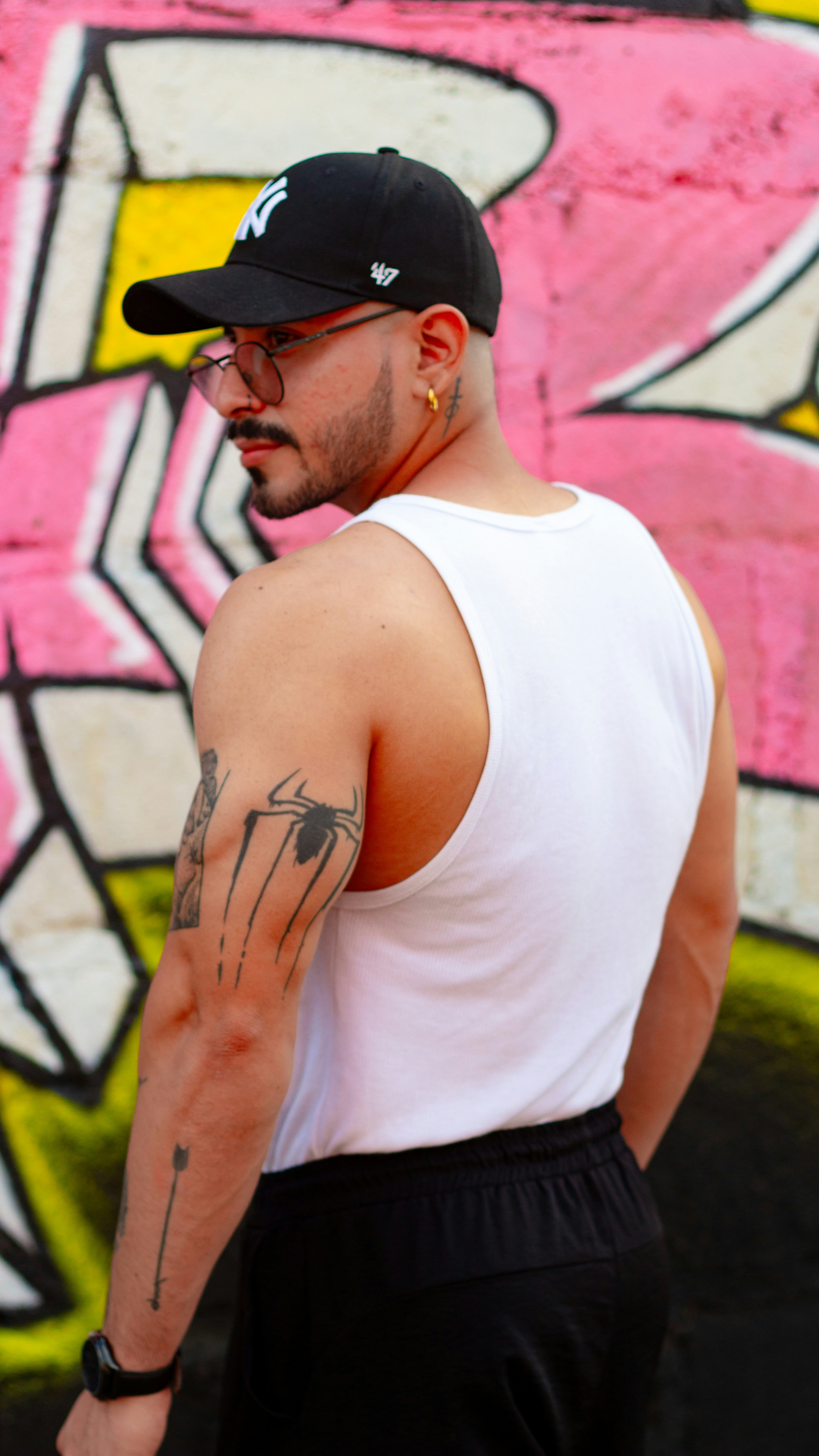 Urban Expression: A Portrait Against Vibrant Backdrops