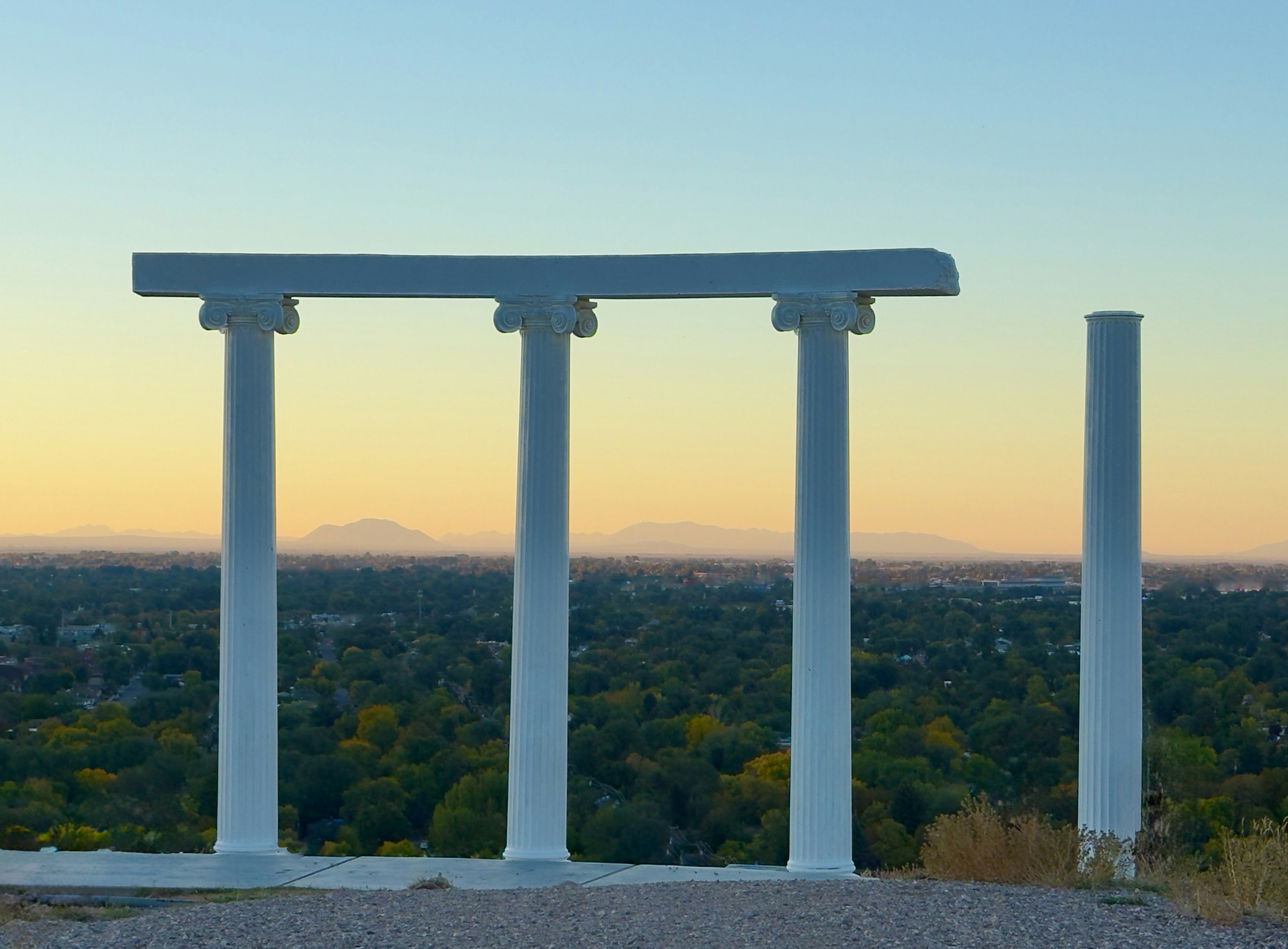 Ancient Columns Framing a Sunset Horizon