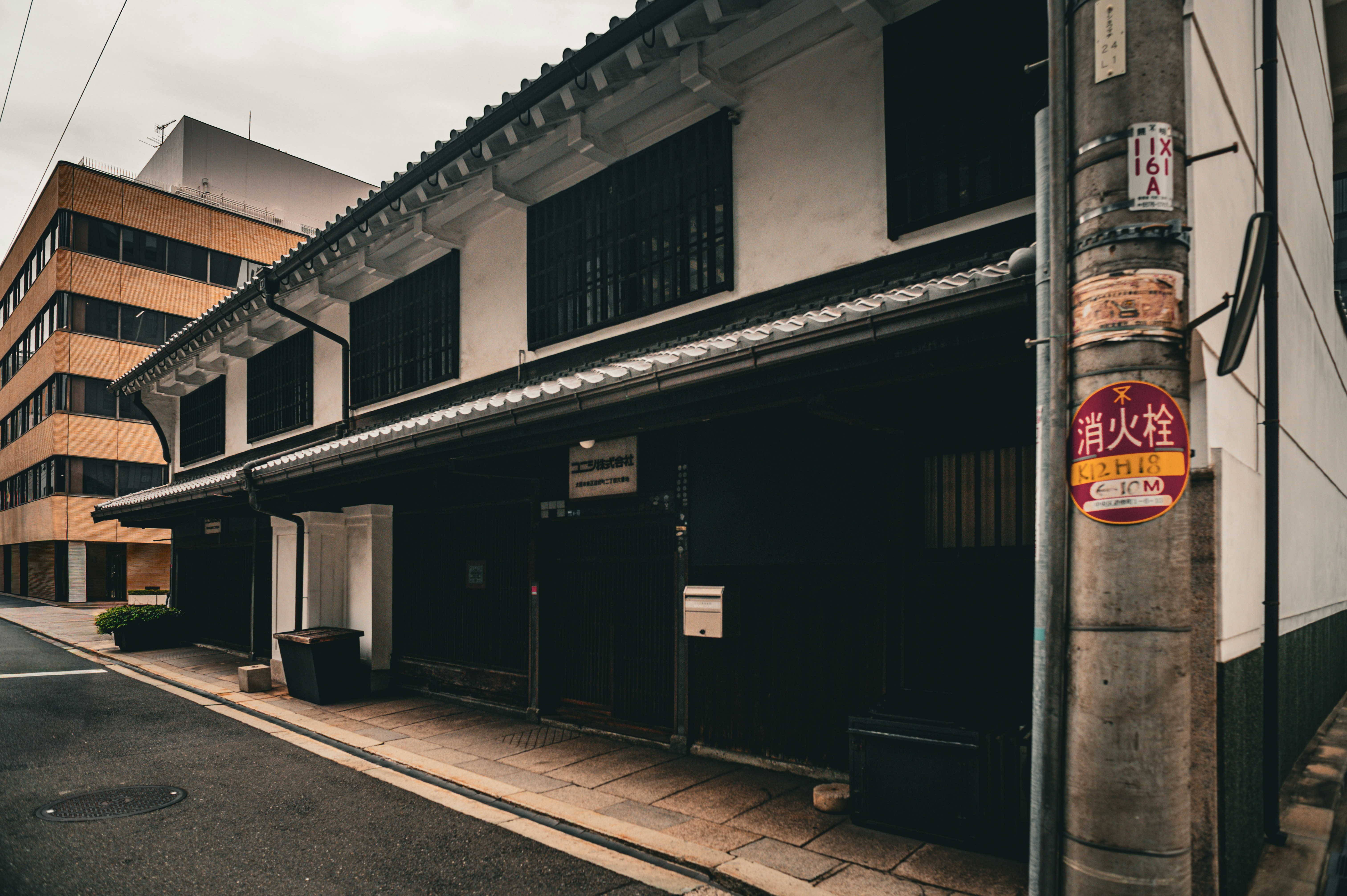 Historic architecture contrasts with contemporary buildings, showcasing a blend of old and new urban landscapes.