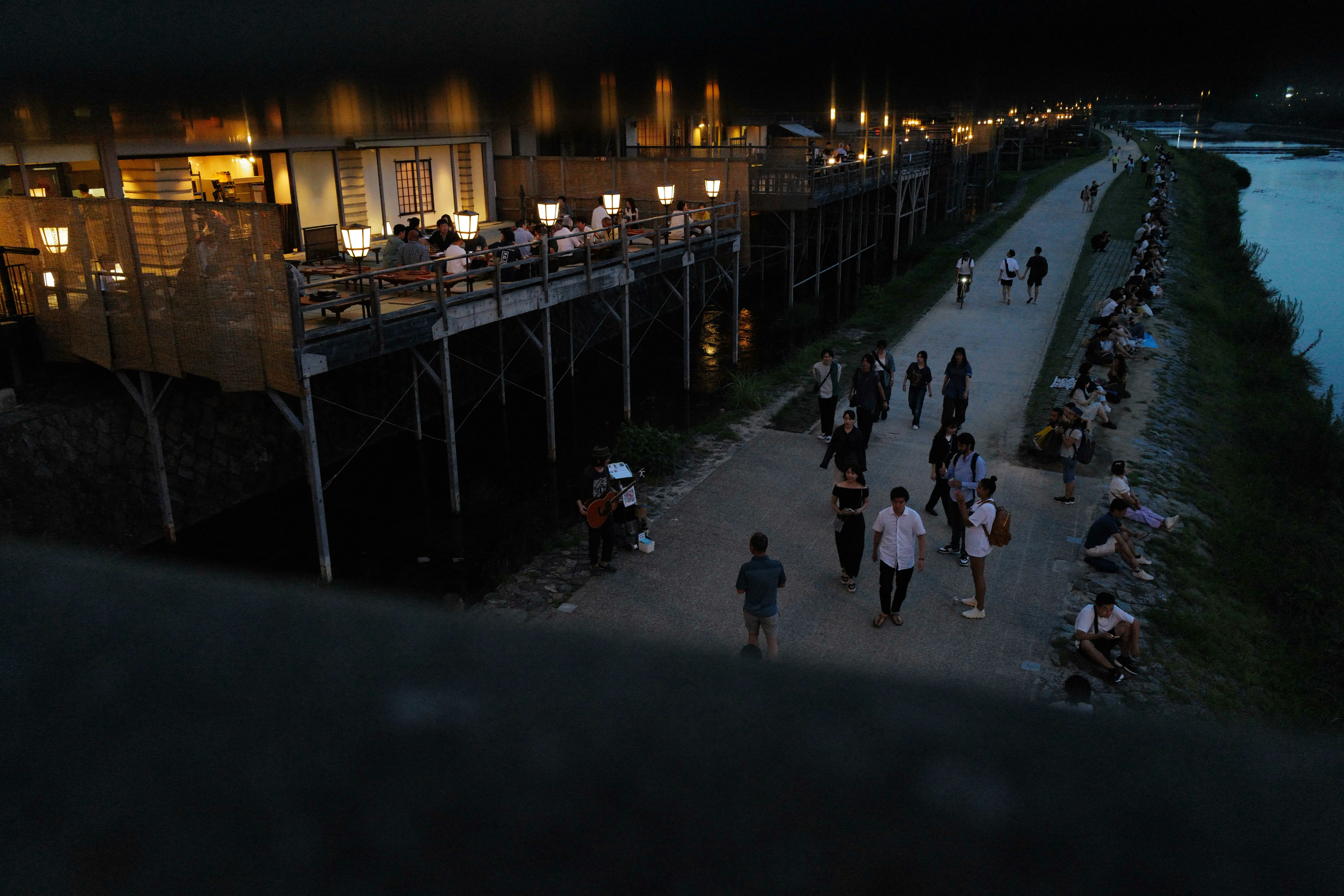 Evening Stroll Along the Riverside Promenade