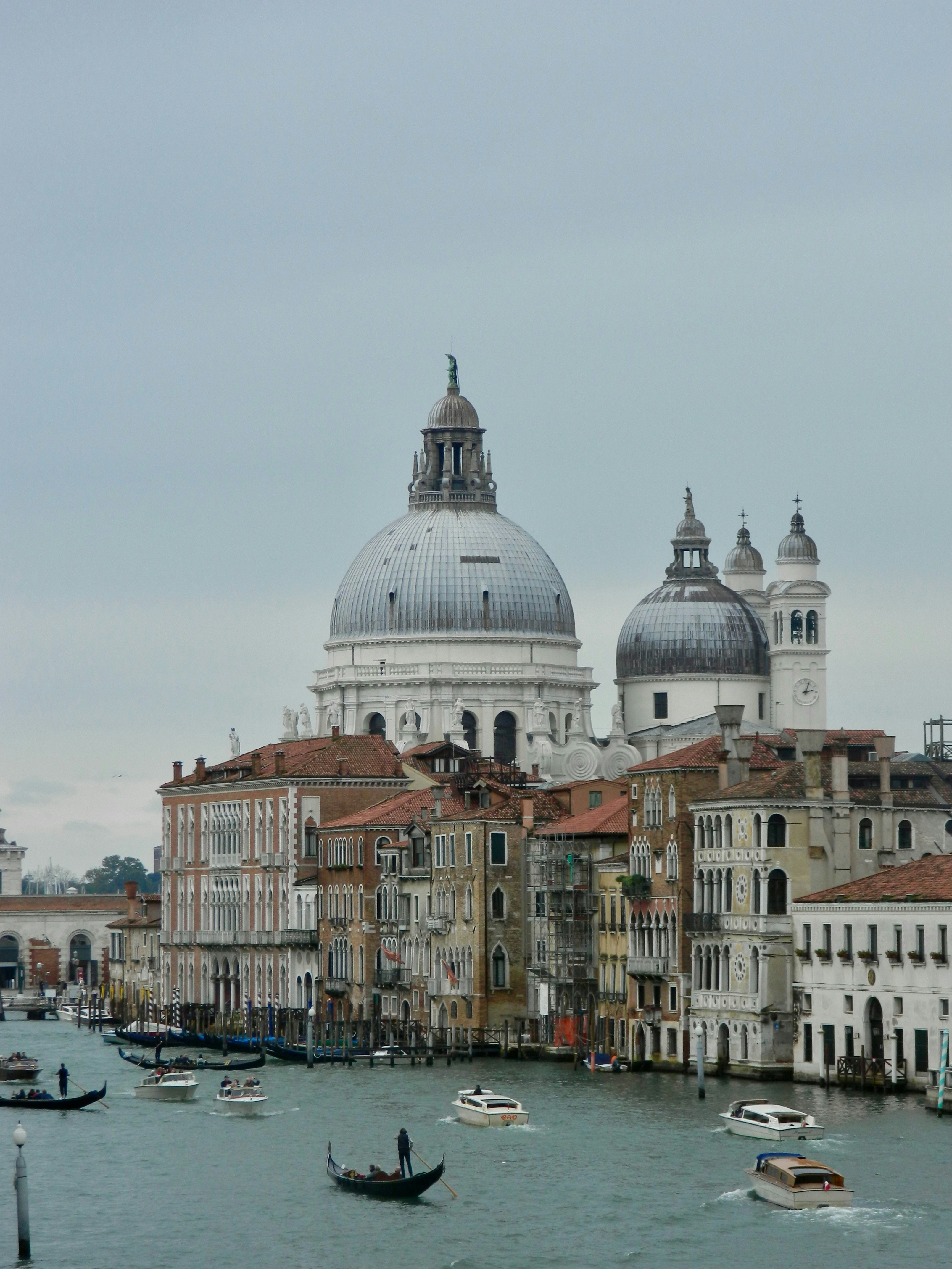 Poetry in Motion. | Venice canal with boats and historic buildings