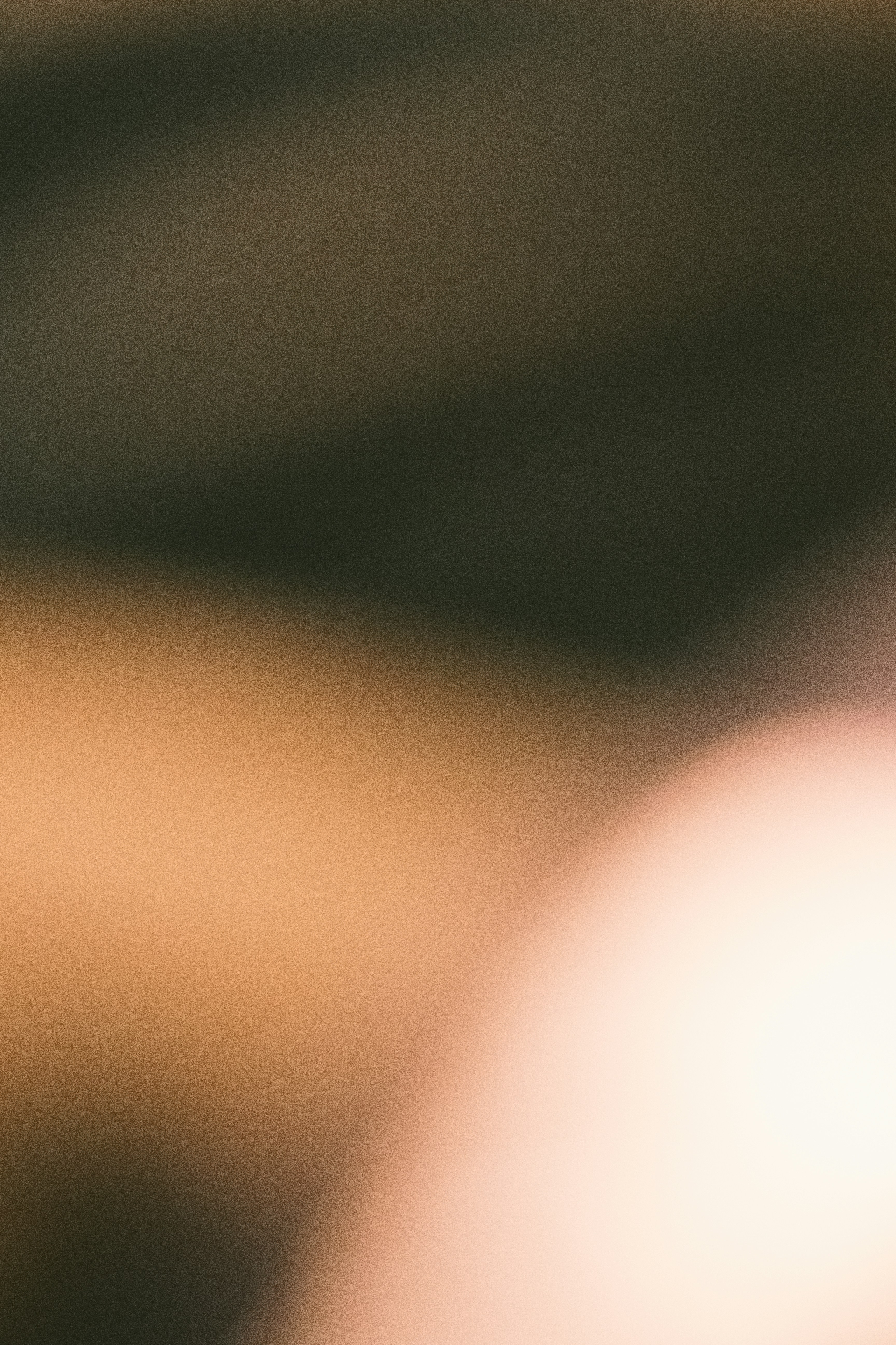 Abstract composition featuring blurred colors and shapes that evoke a sense of tranquility and depth.