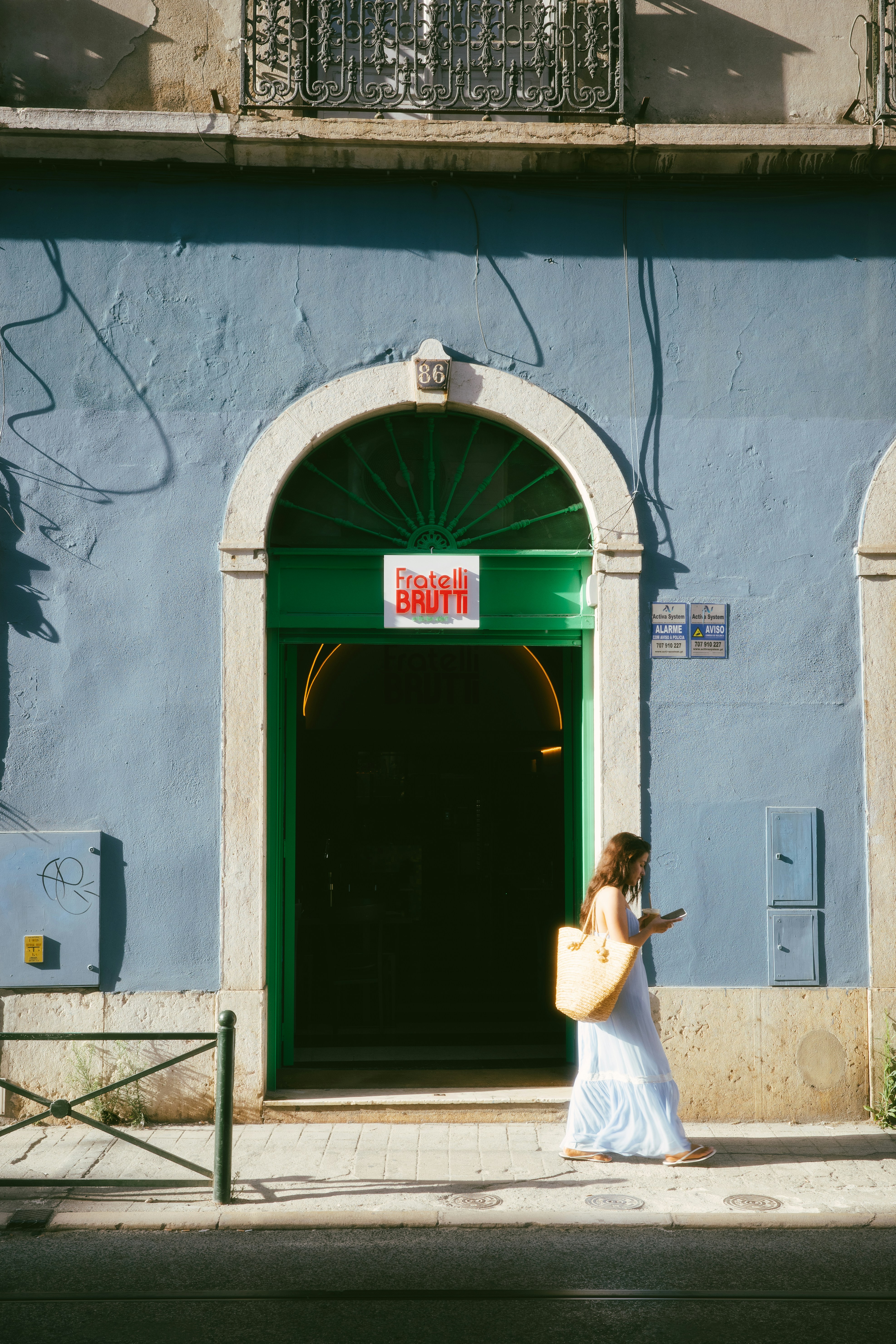 A Stroll by the Vibrant Green Doorway