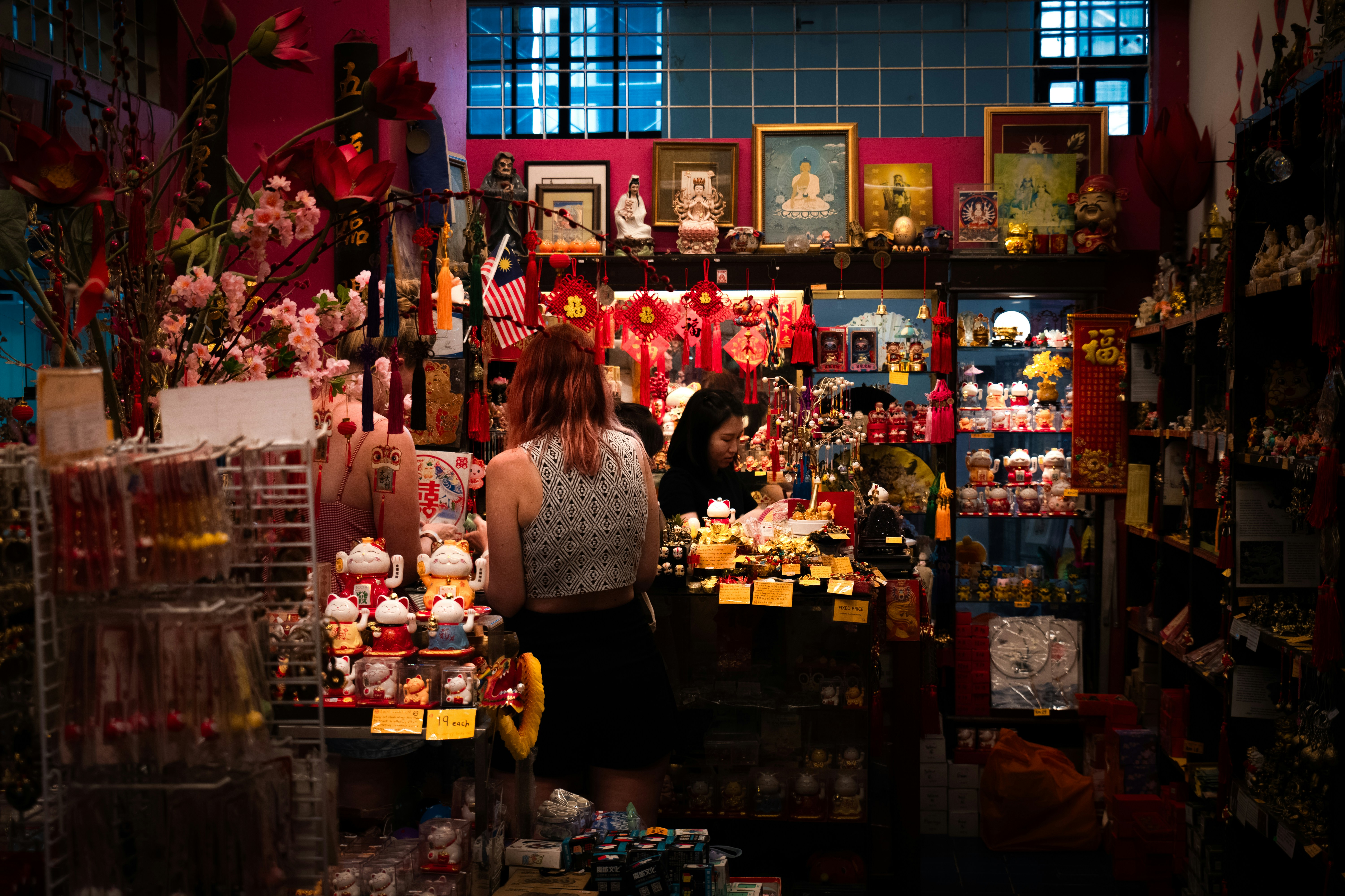 woman shopping for souvenirs at a gift shop