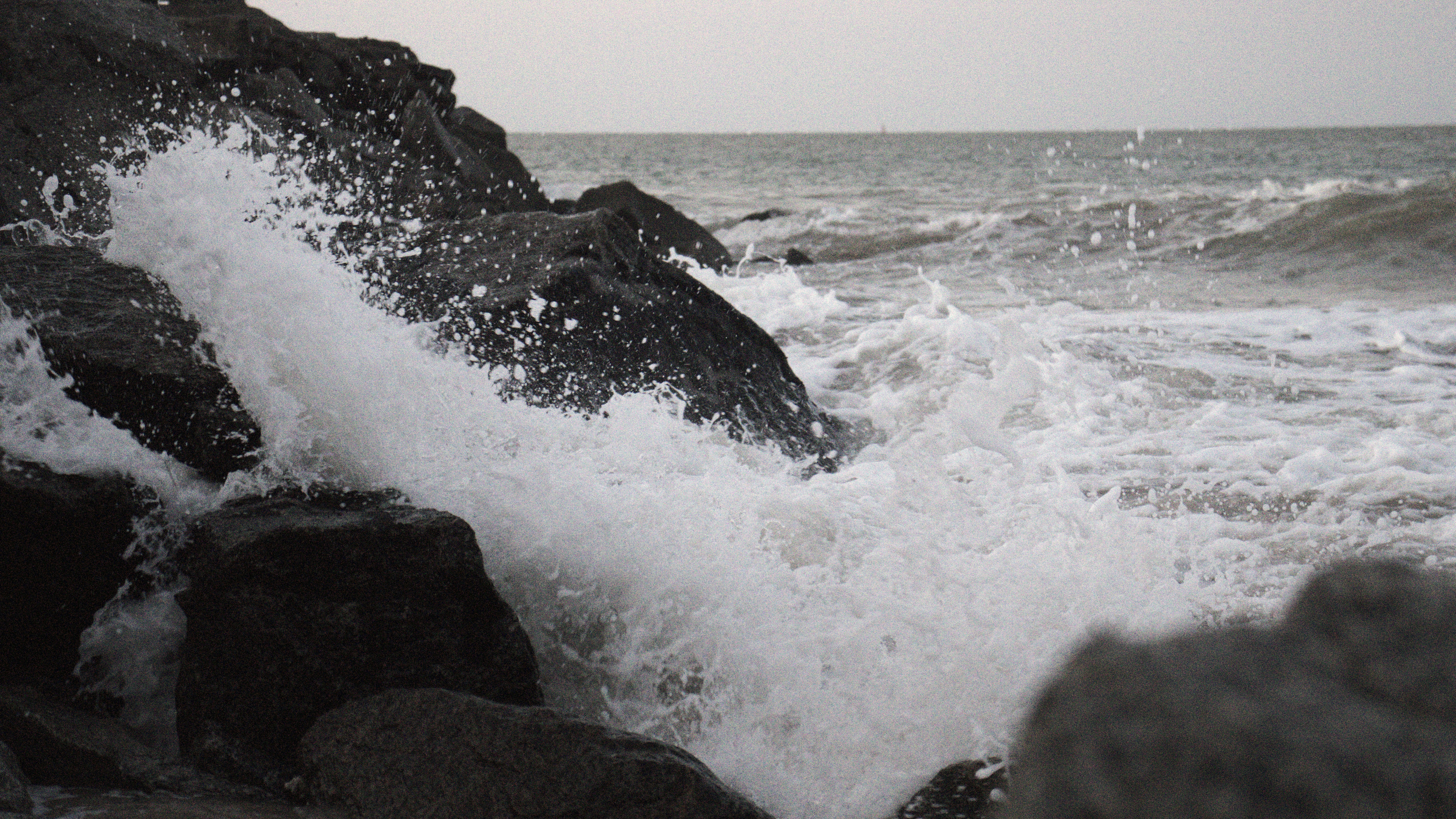 Rhythm of the Waves: A Dance with the Rocks
