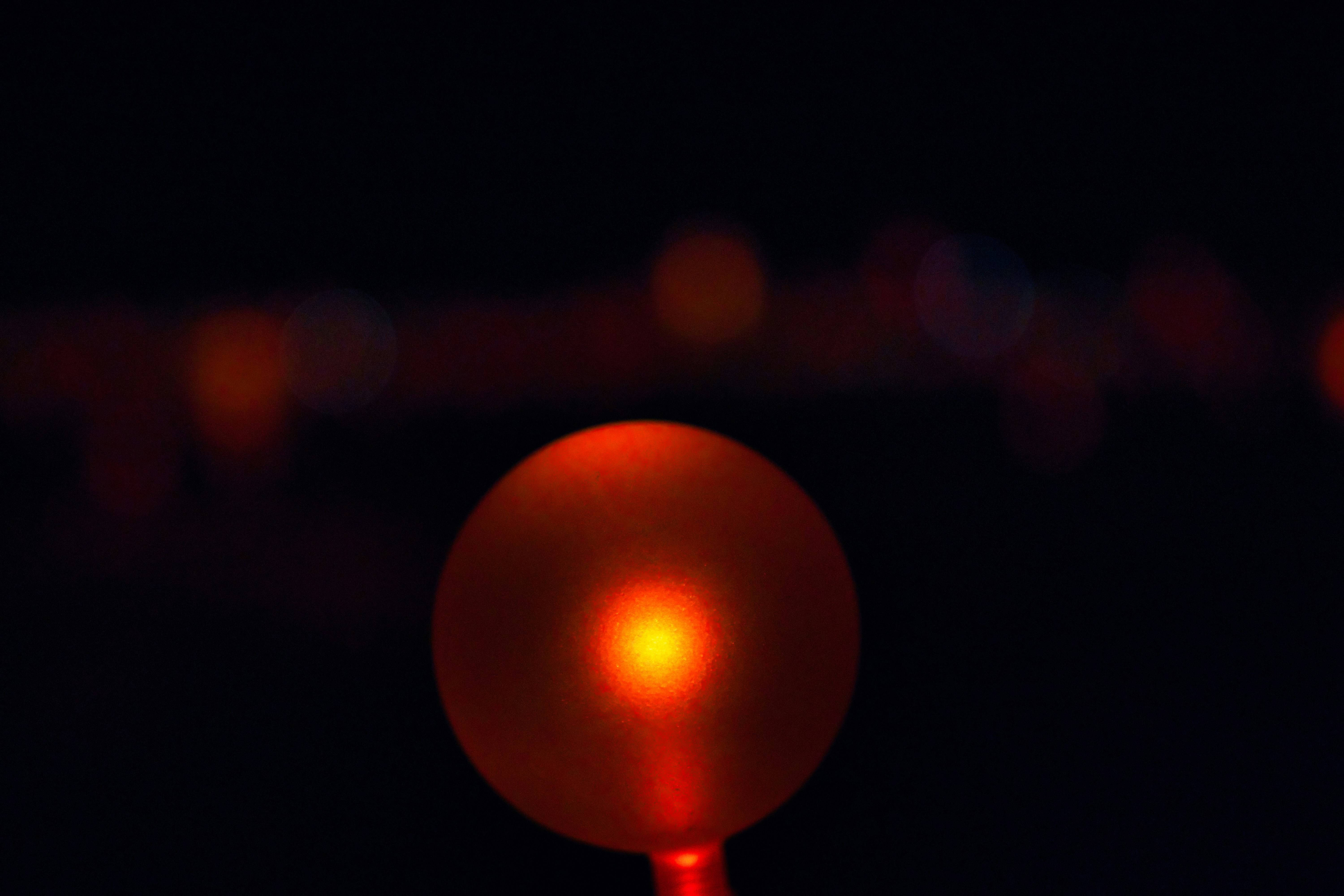 Illuminated Sphere Amidst a Dusk Canvas