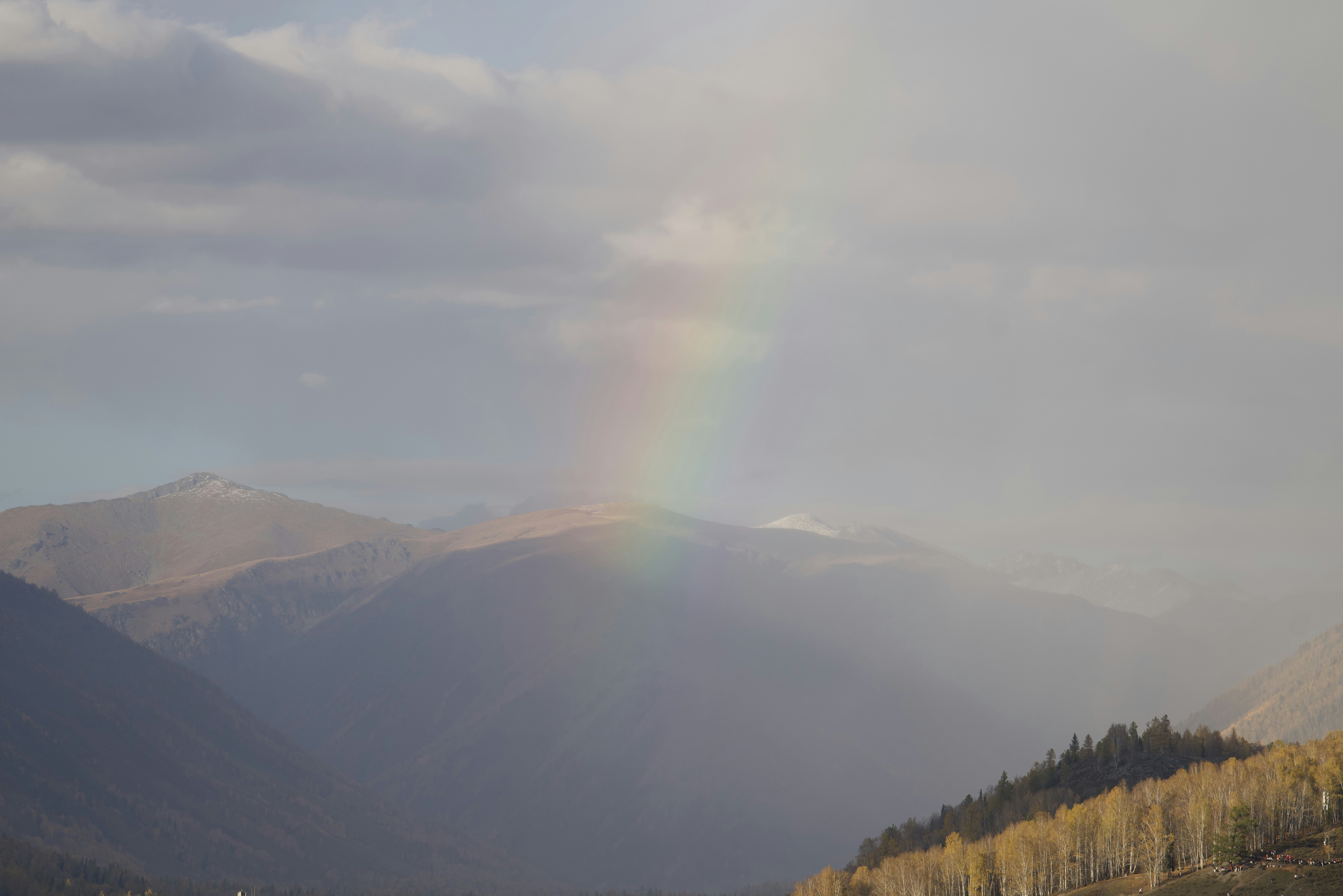 Arc of Color Over an Autumn-Alpine Valley