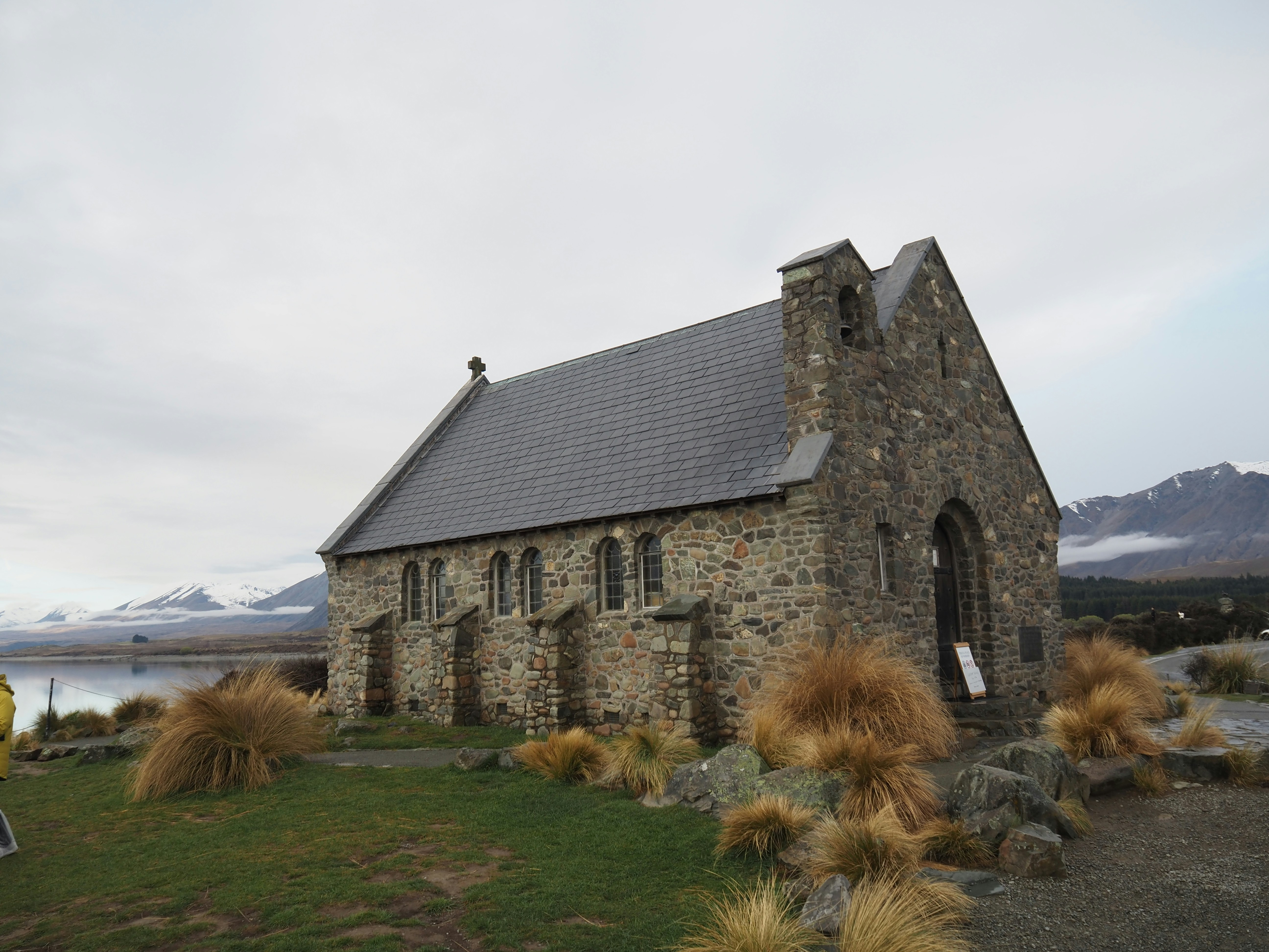 Overcast day in Tekapo, front and side of old church
