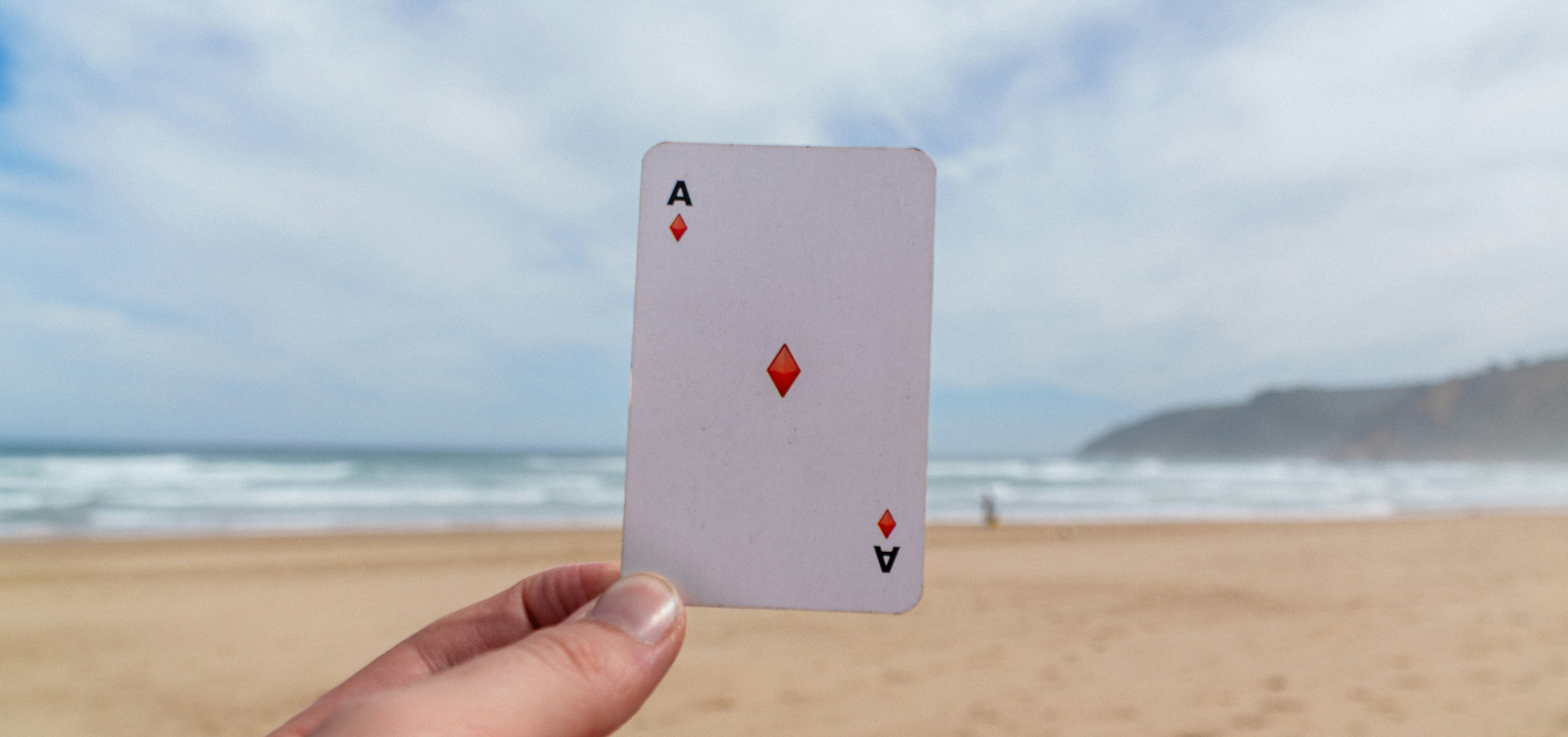 Ace of Diamonds Against the Ocean's Backdrop