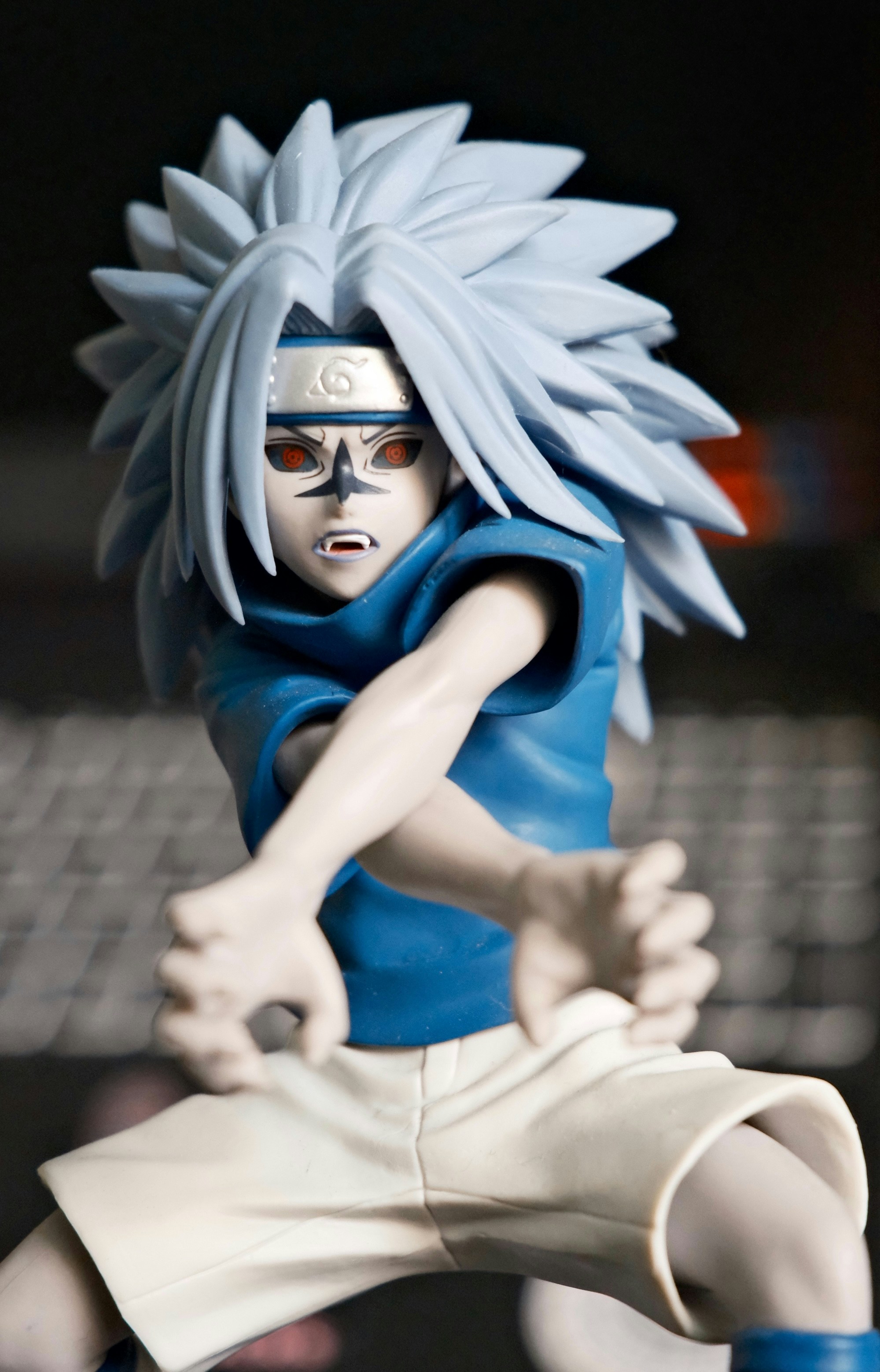 Toys | Anime character with spiky white hair and red eyes.