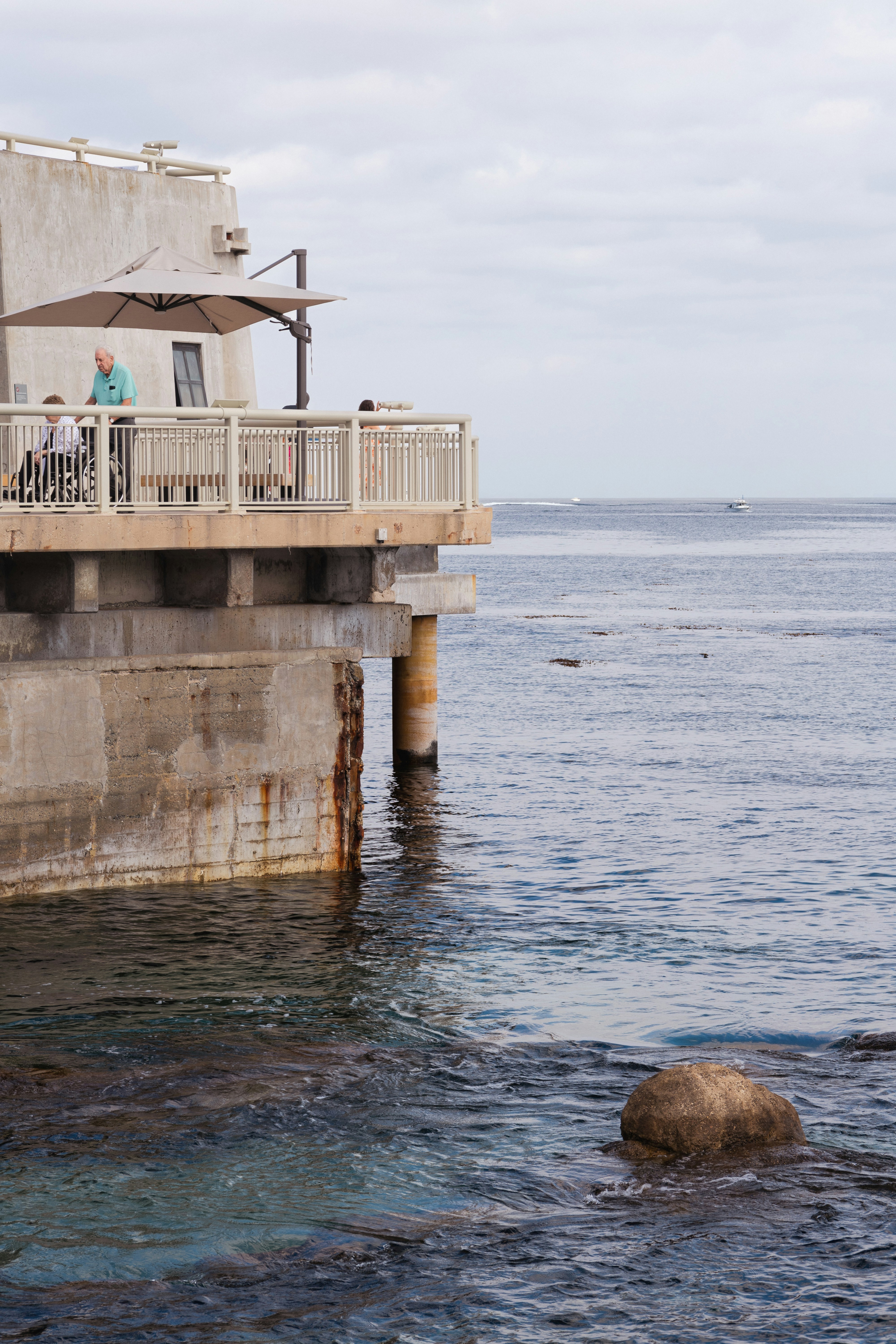 Seaside Terrace: Quiet Conversation by the Horizon