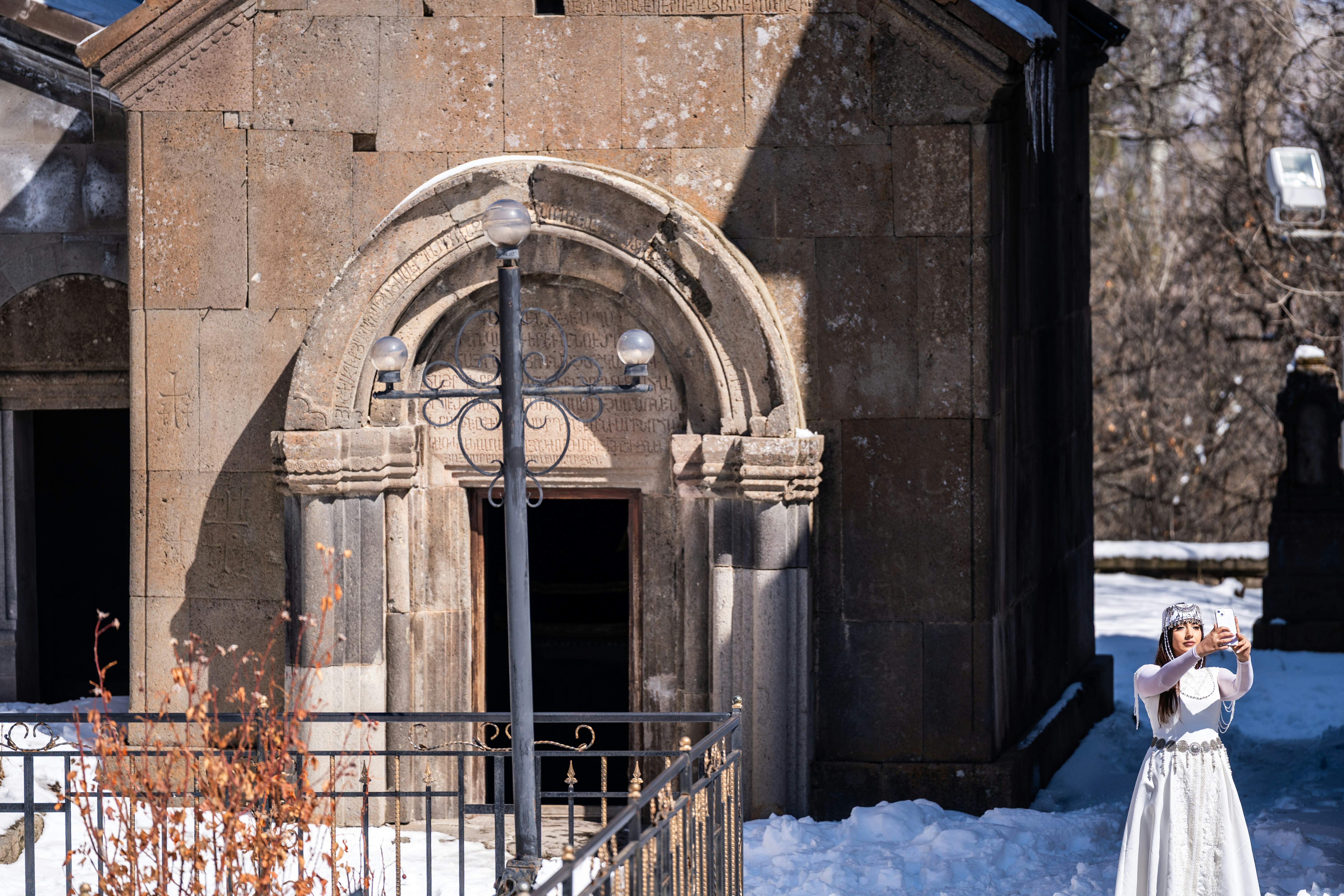 Whispers of Time: A Moment Amidst Stone and Snow