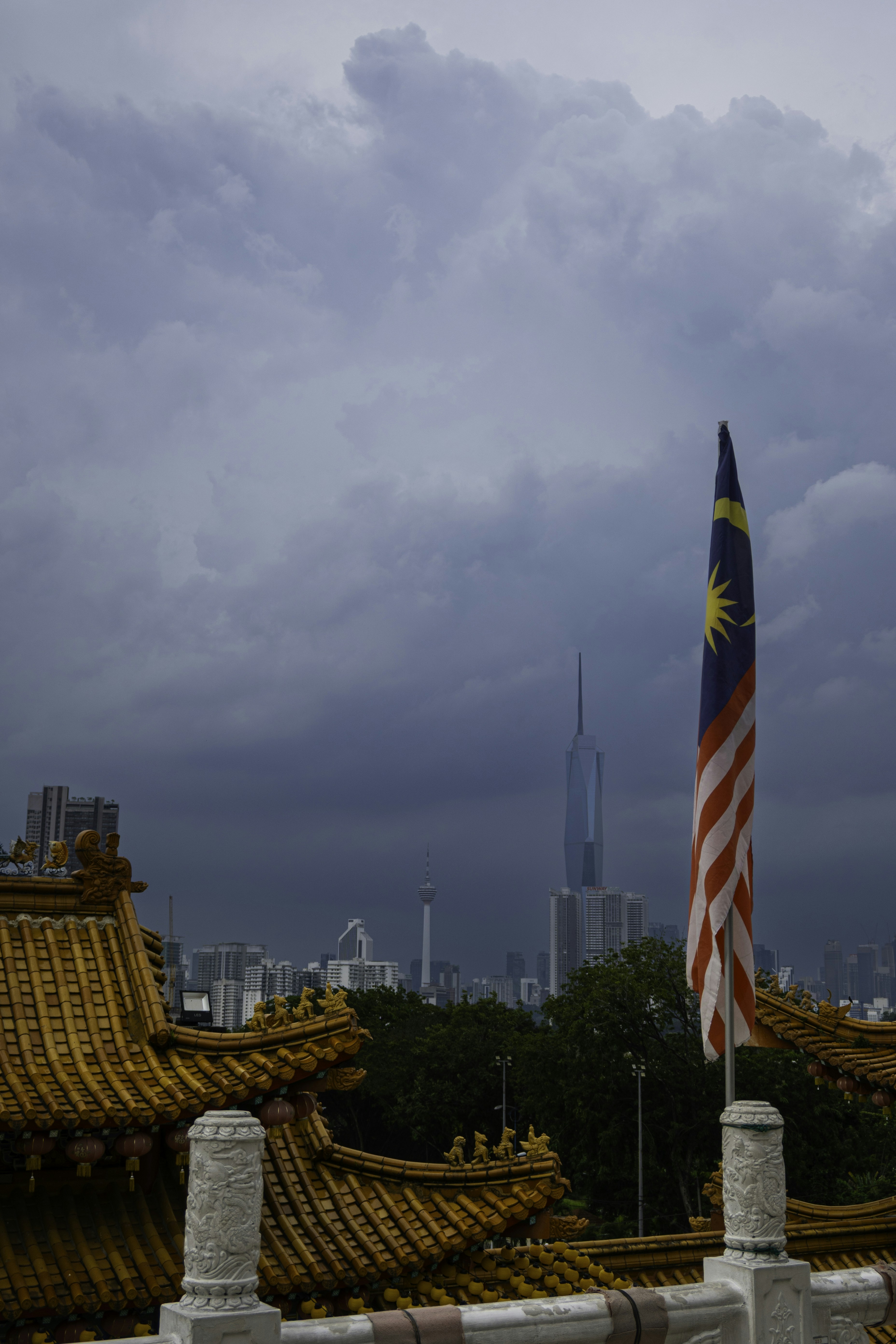 Flag Above Golden Roofs: Tradition Meets a Skyward Skyline